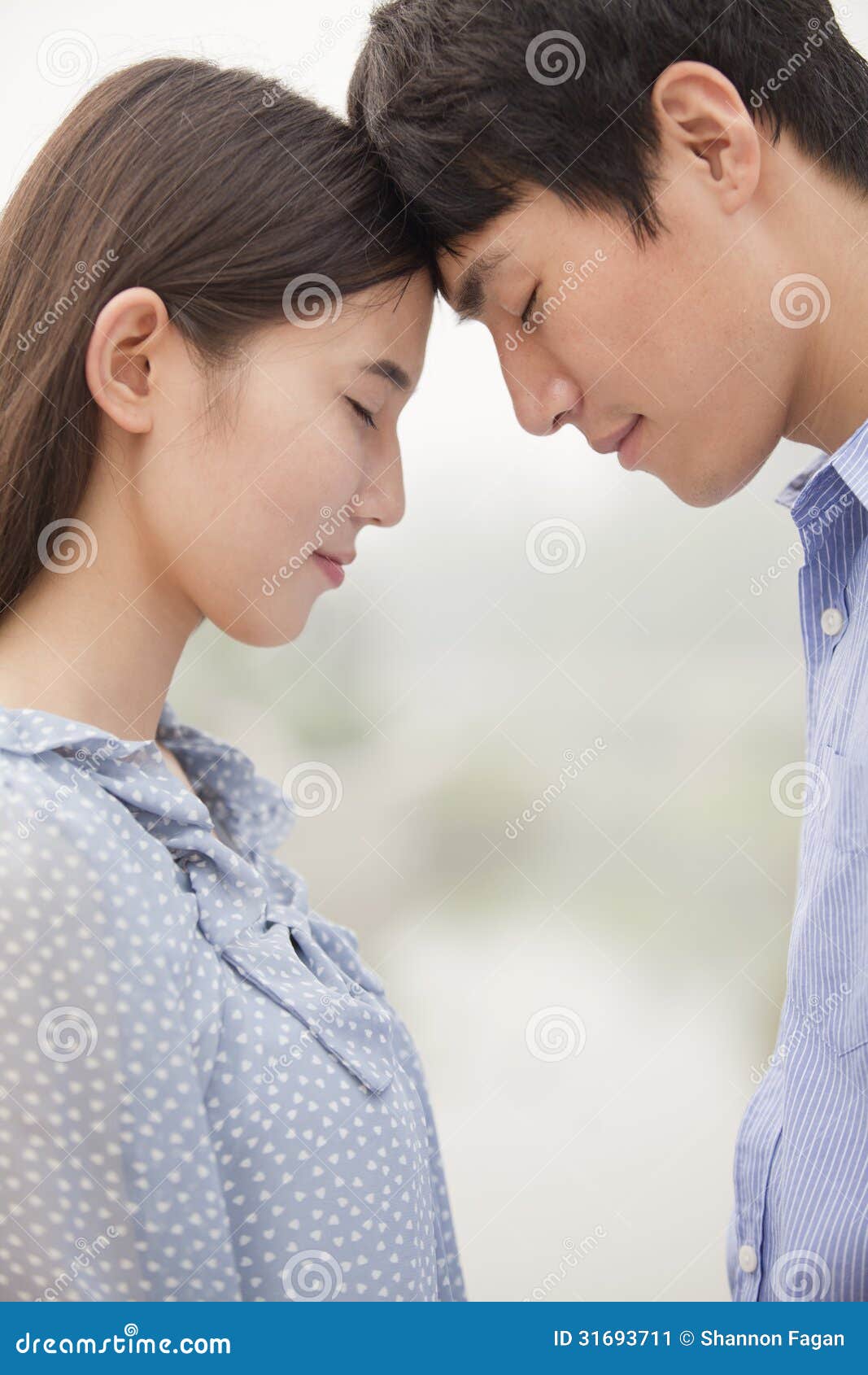 Young Couple Touching Foreheads Stock Image - Image of face, beijing ...