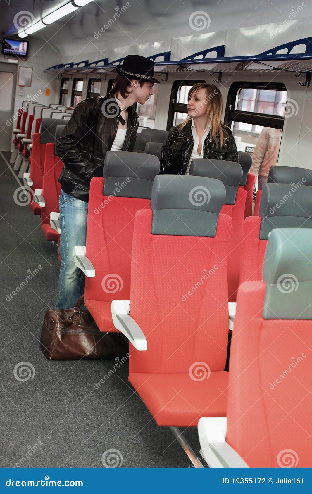 Young couple in train stock photo. Image of woman, transportation ...