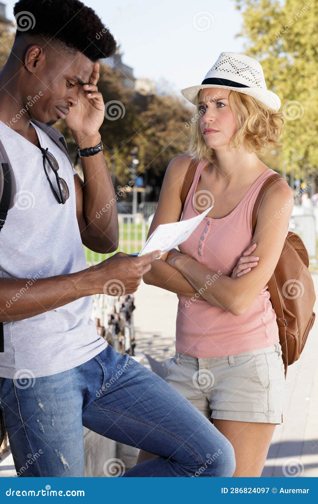 Young Couple Traveler Lost in City Using Map Stock Image - Image of ...