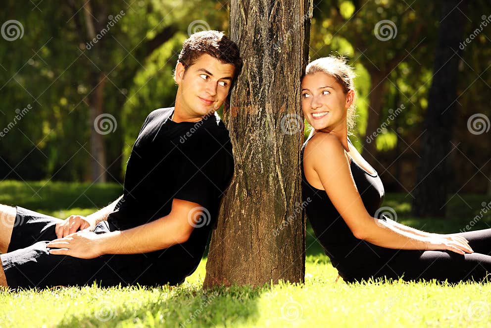 Young couple and a tree stock photo. Image of relationship - 16270646
