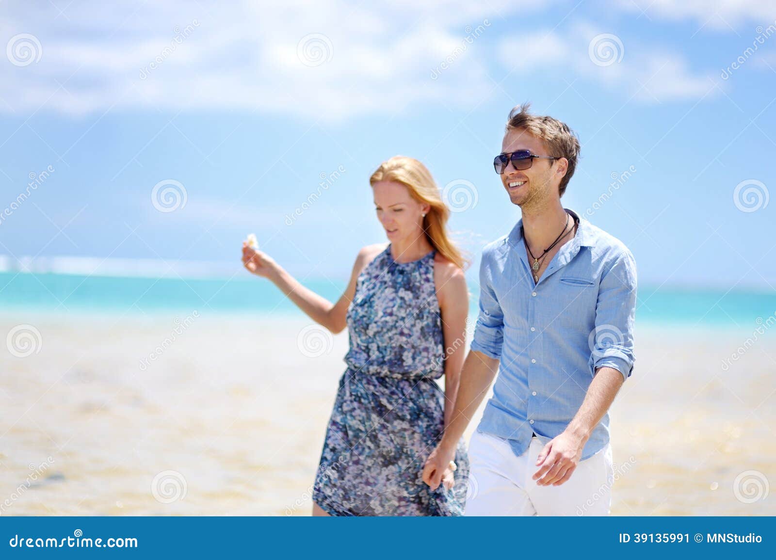 Young Couple on a Tropical Island Stock Image - Image of care, shore ...