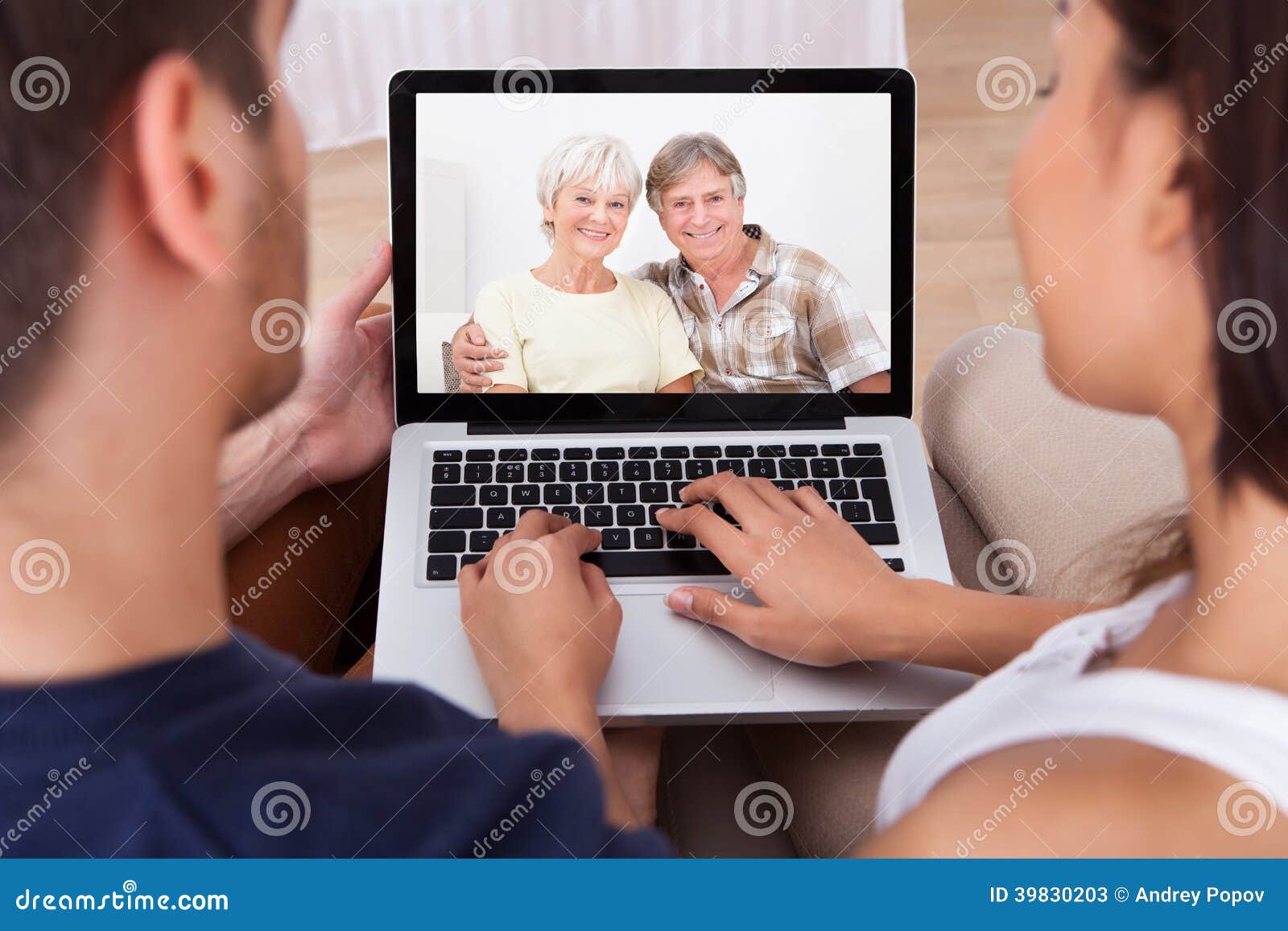 Young Couple Using Calling Parents Stock Image - Image of love ...