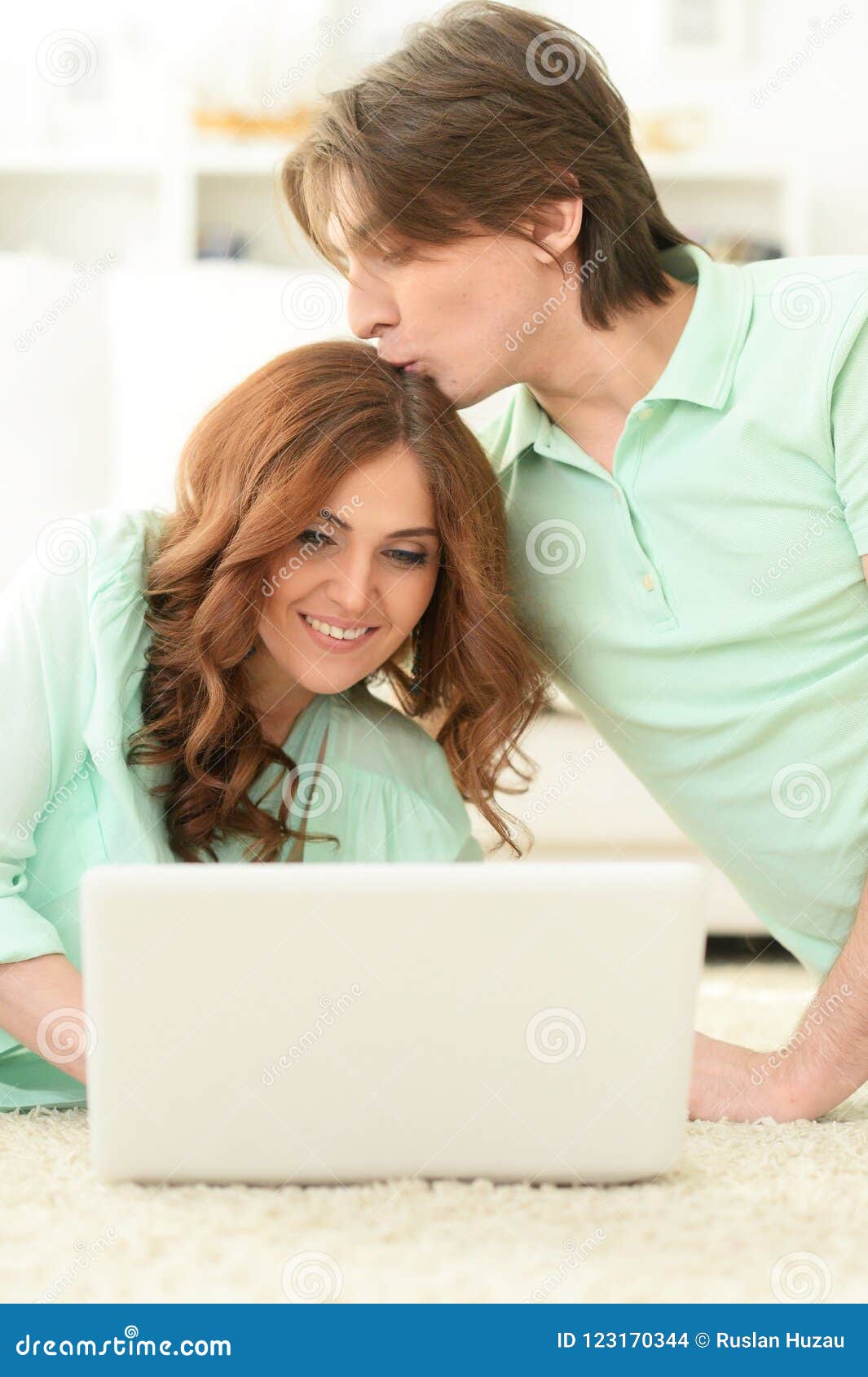 Young couple using laptop stock photo. Image of handsome - 123170344