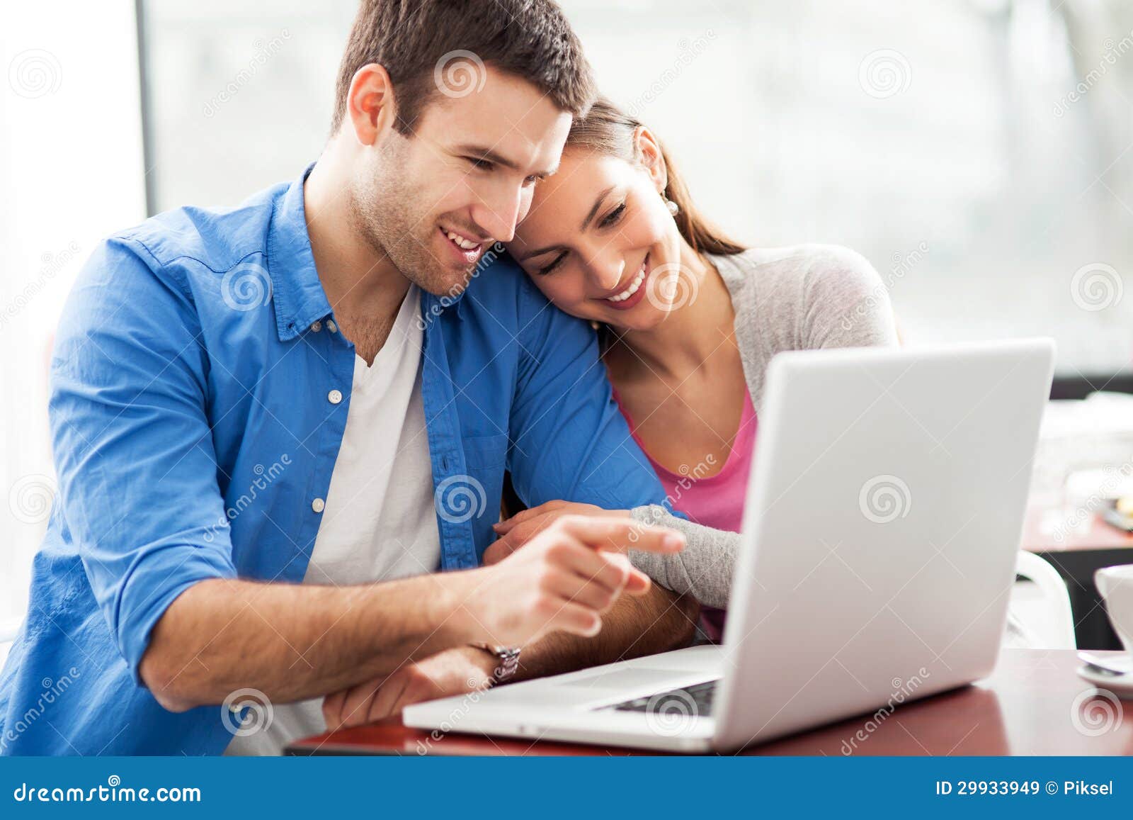 Couple looking at laptop stock image. Image of toothy - 29933949