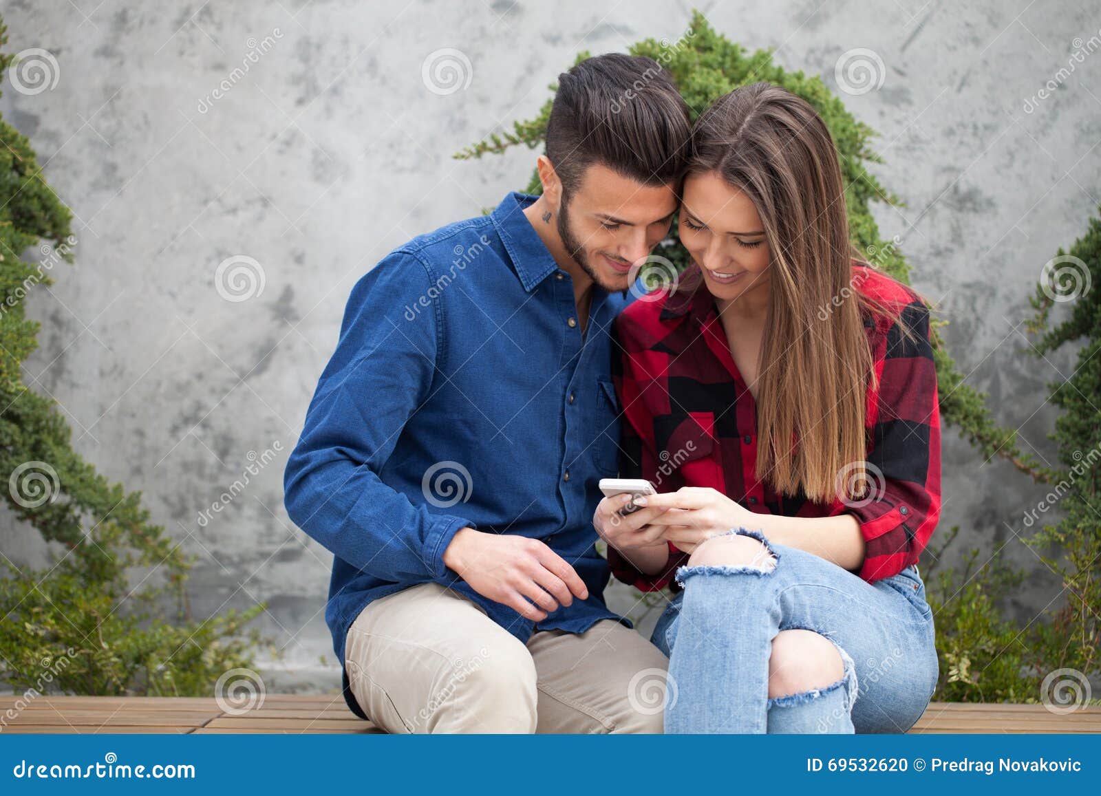 Young Couple Using Smart Phone Stock Photo - Image of call, device ...