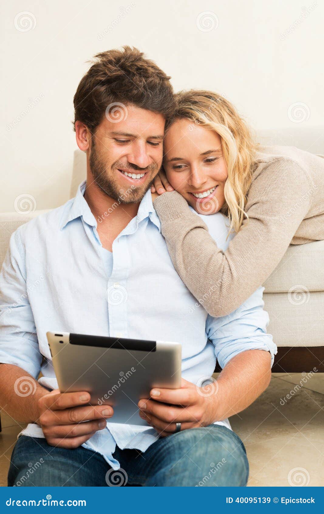 Young Couple Using Tablet Computer Stock Image - Image of interior ...