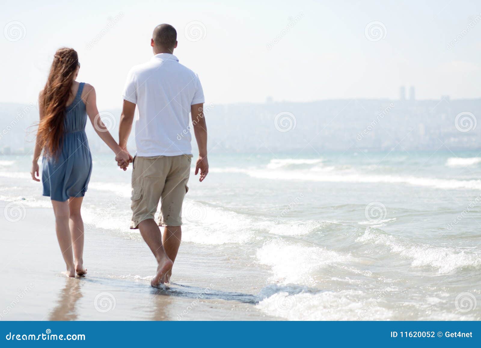 Young Couple Walk at the Beach Stock Photo - Image of attractive, hands ...