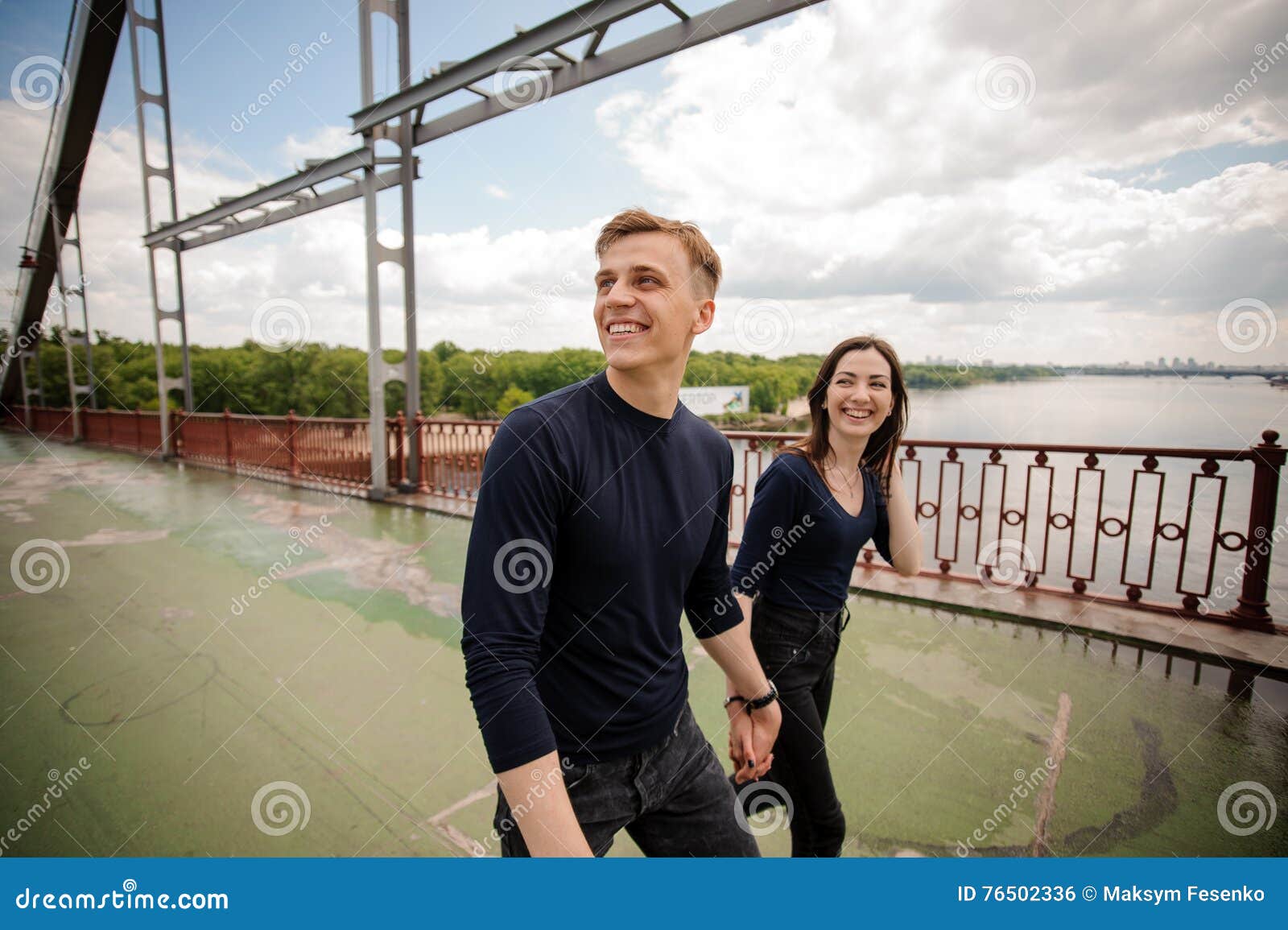 Young Couple Walking on Bridge Stock Photo - Image of honeymoon ...