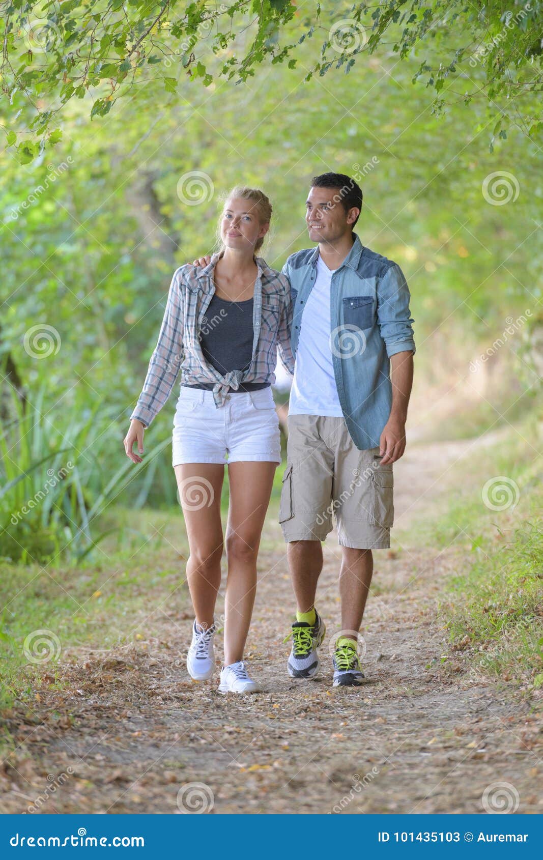 Young Couple Walking in Forest Stock Image - Image of male, female ...