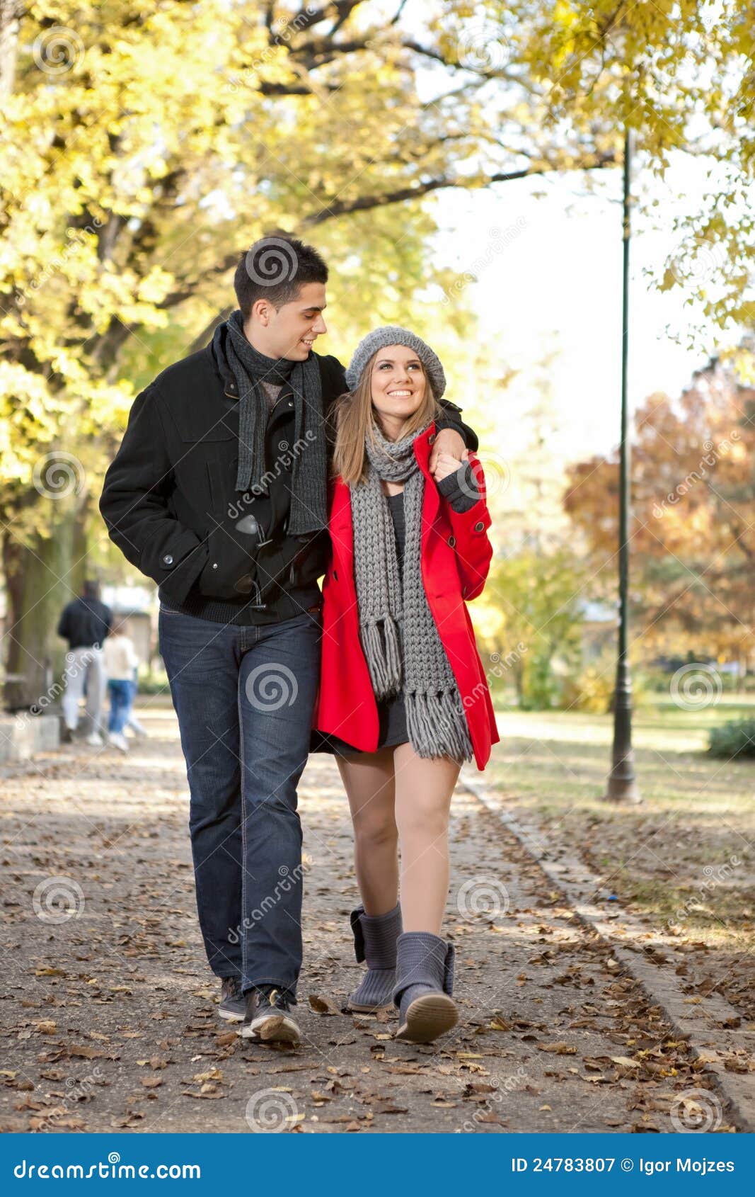 Young Couple Walking In Park Royalty Free Stock Photography - Image ...