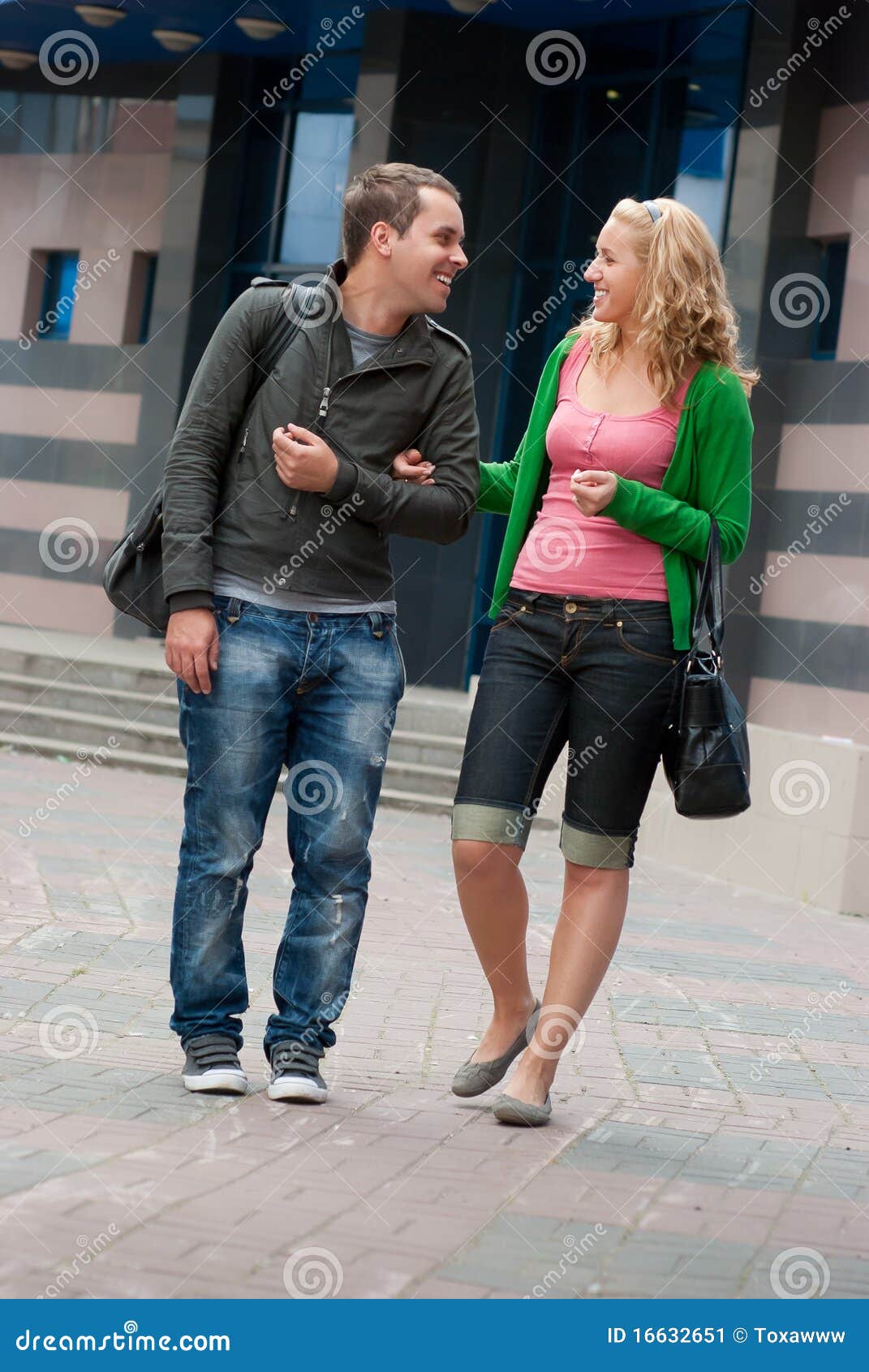 Young Couple Walking and Talking Stock Image - Image of person ...