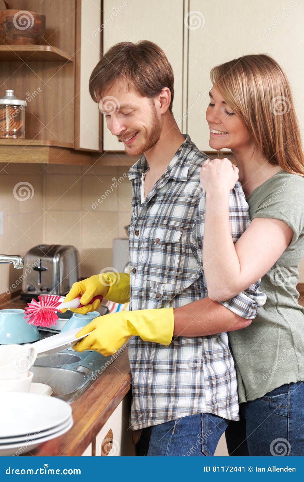Young Couple Washing Up at Sink Together Stock Image - Image of dishes ...