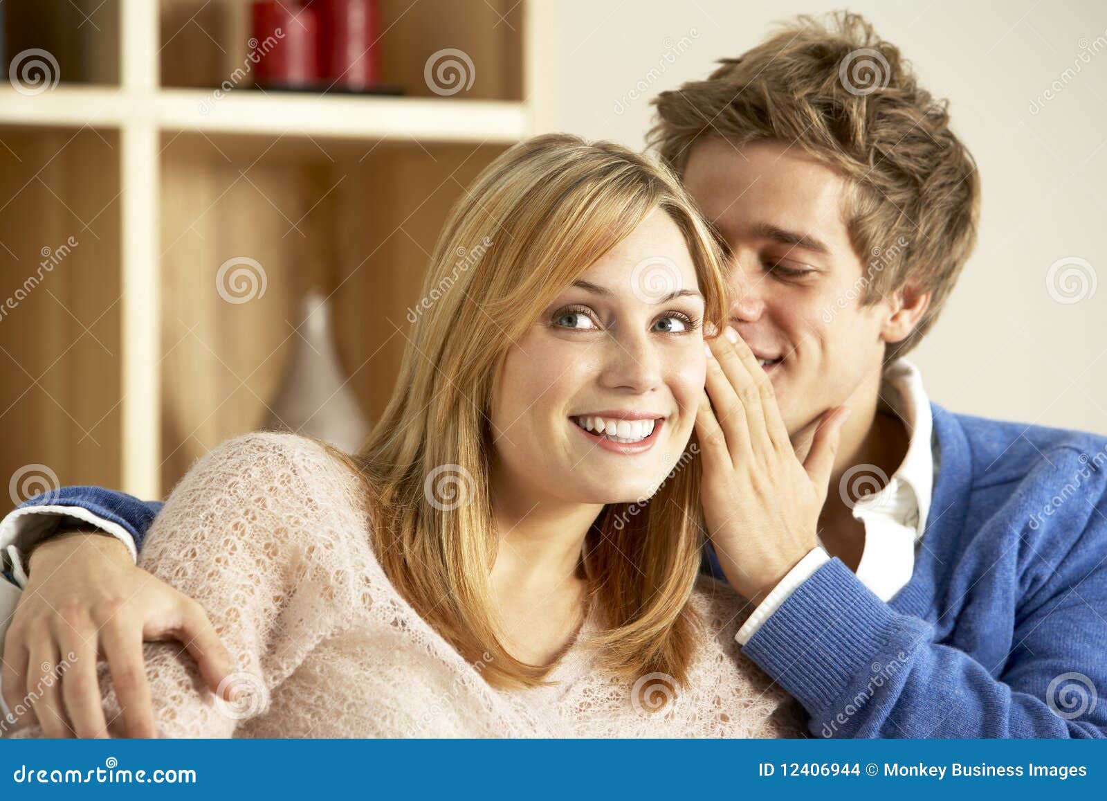 Young Couple Whispering To Each Other Stock Photo - Image of person ...