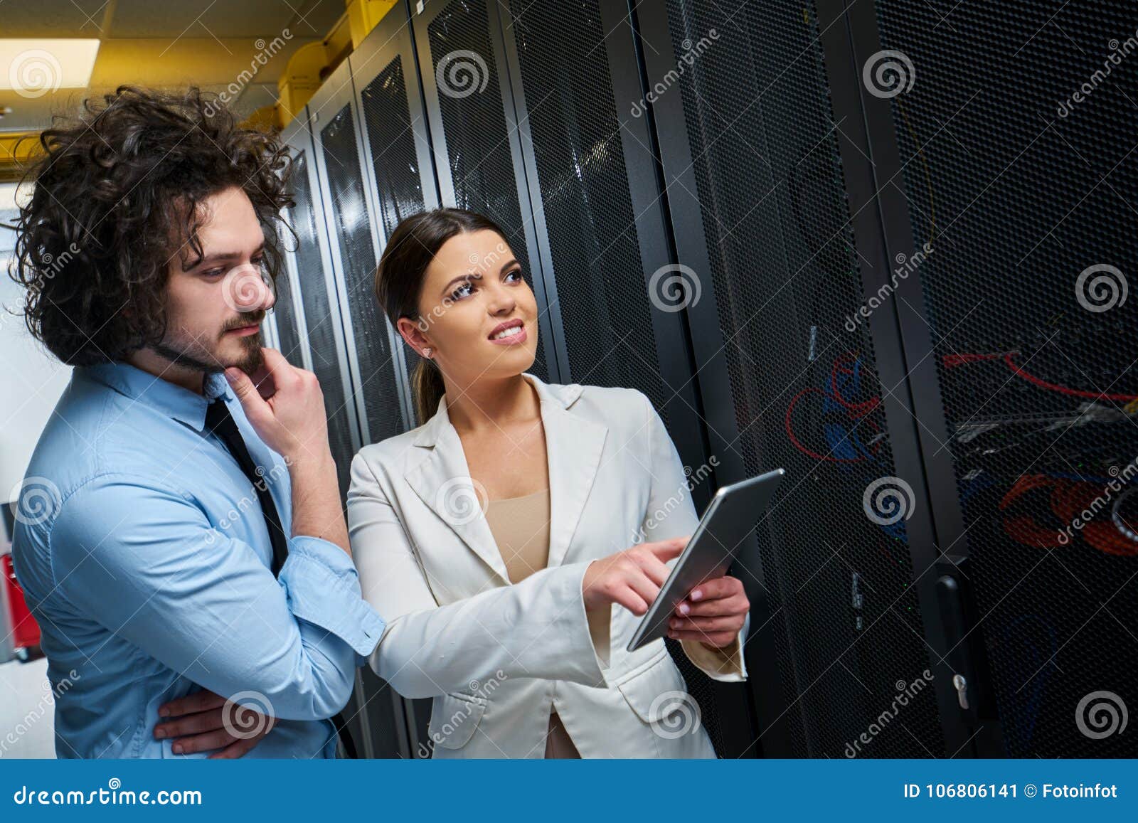 Young Couple Working at a Data Center Stock Image - Image of ...