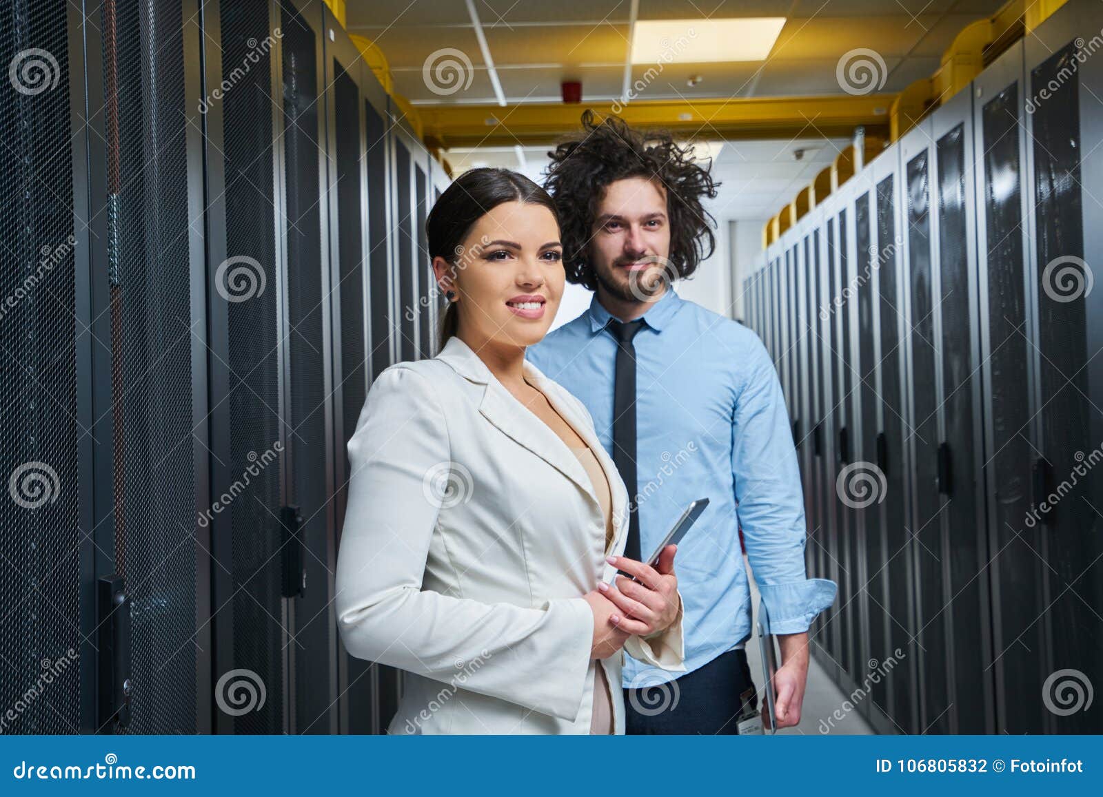 Young Couple Working at a Data Center Stock Photo - Image of ...