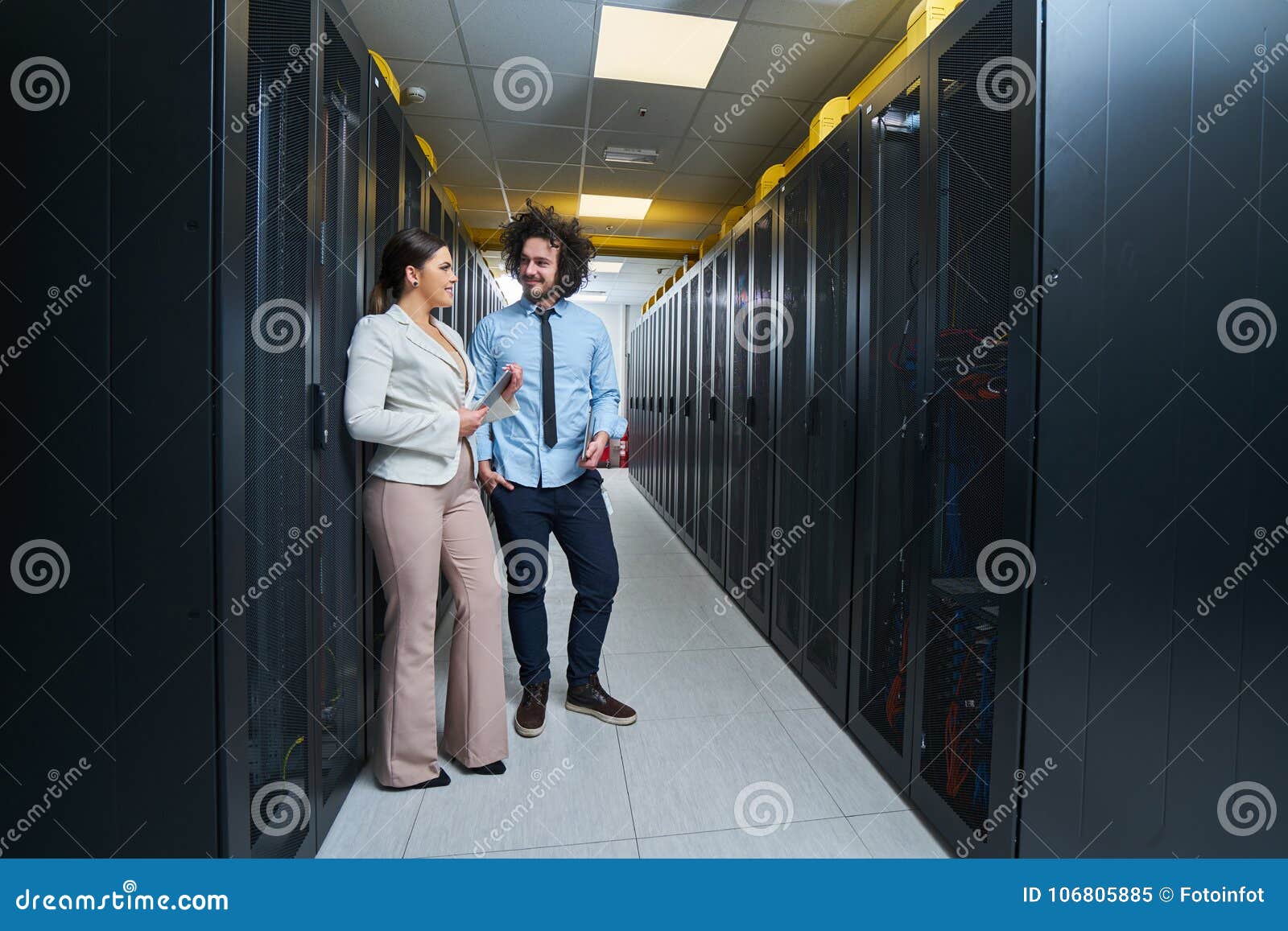 Young Couple Working at a Data Center Stock Image - Image of mounted ...