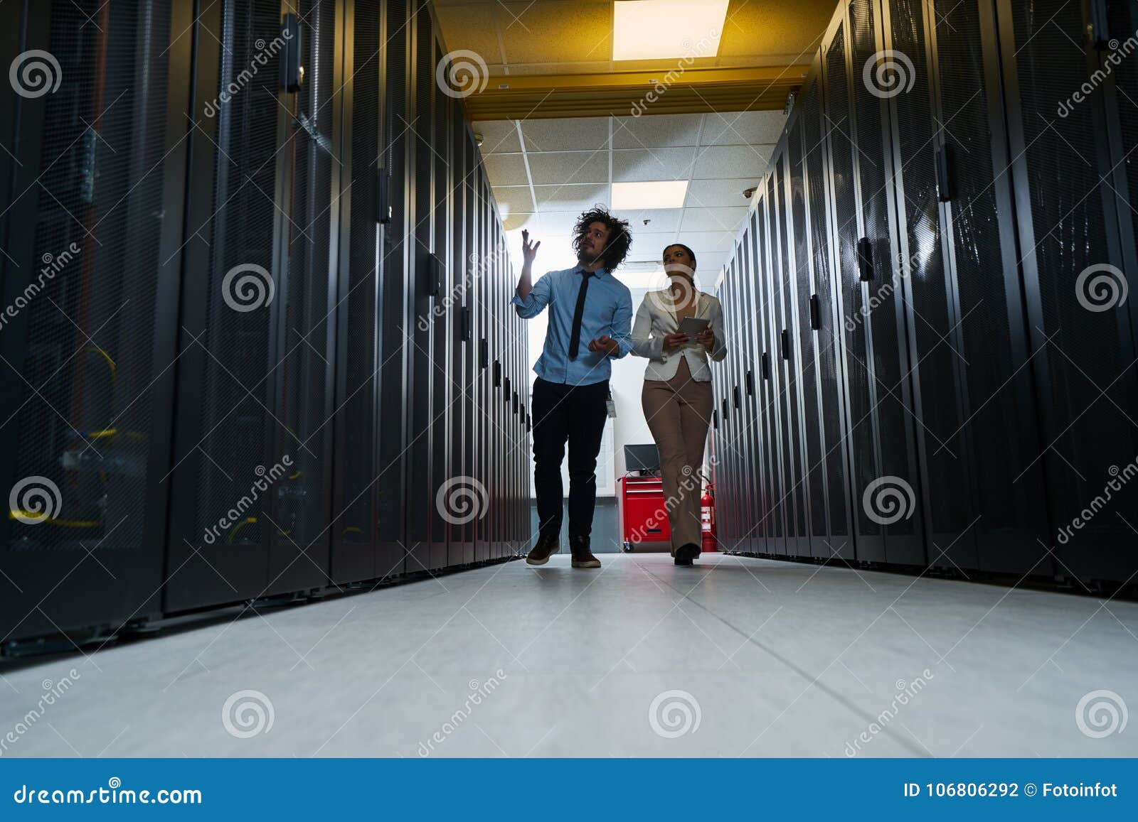 Young Couple Working at a Data Center Stock Photo - Image of portrait ...