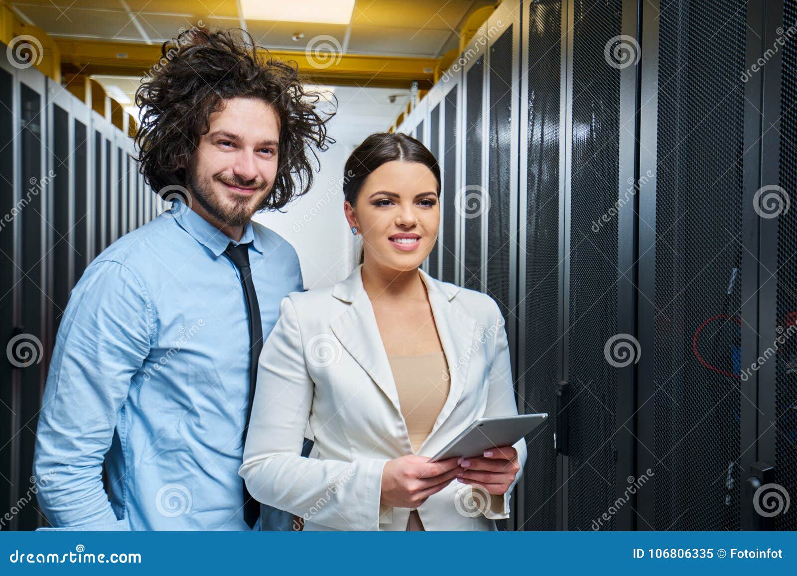Young Couple Working at a Data Center Stock Image - Image of checking ...