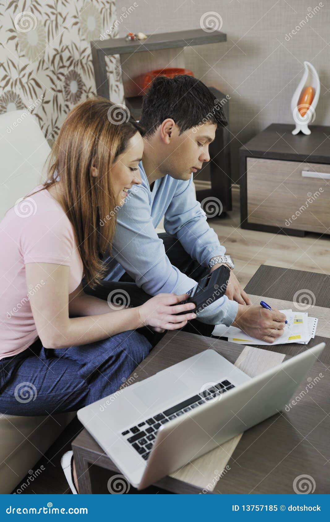 Young Couple Working on Laptop at Home Stock Image - Image of estate ...
