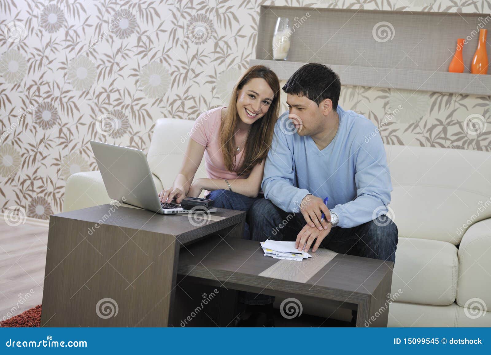 Young Couple Working on Laptop at Home Stock Image - Image of casual ...