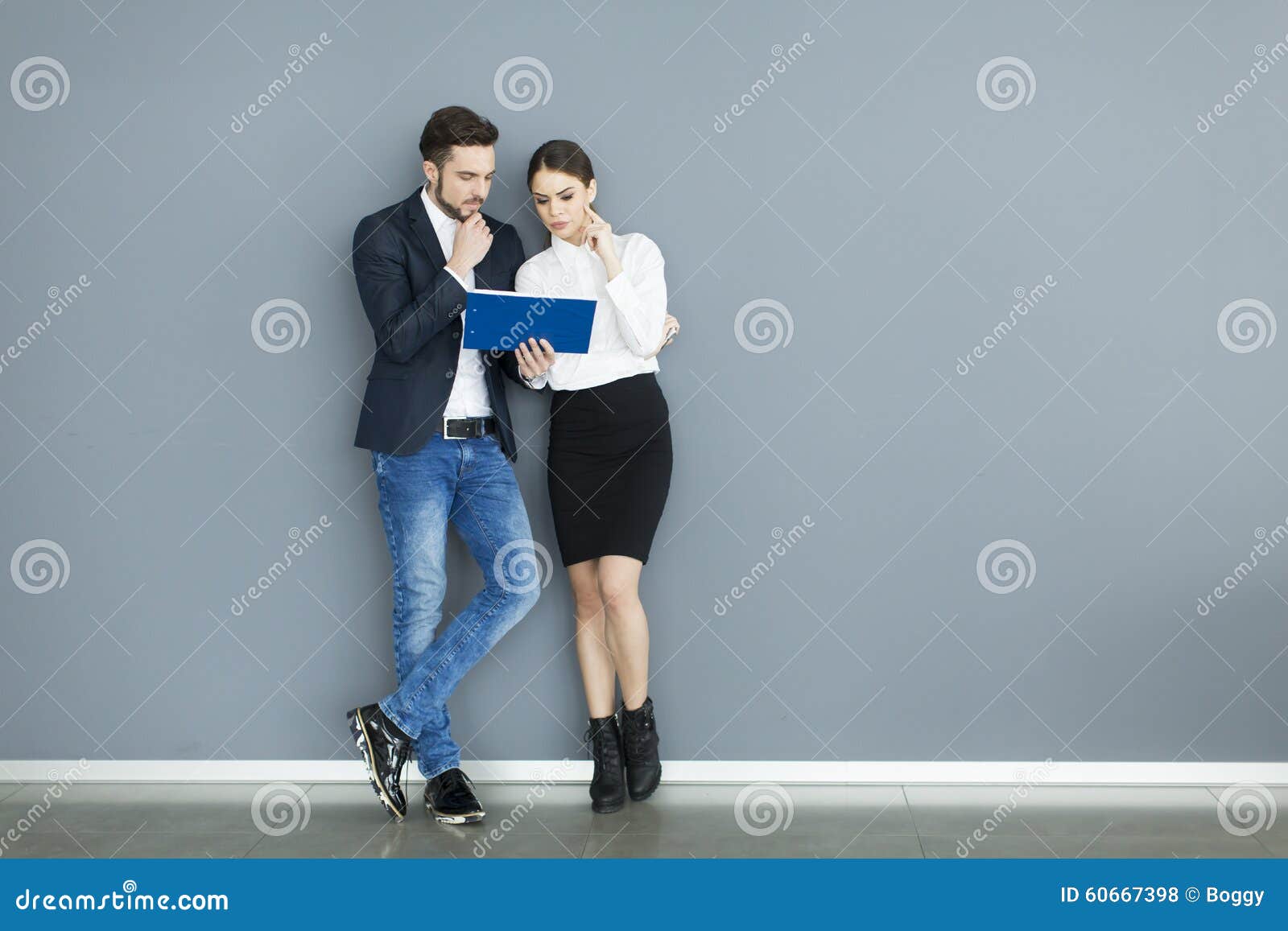 Young Couple Working in the Office Stock Photo - Image of couple ...