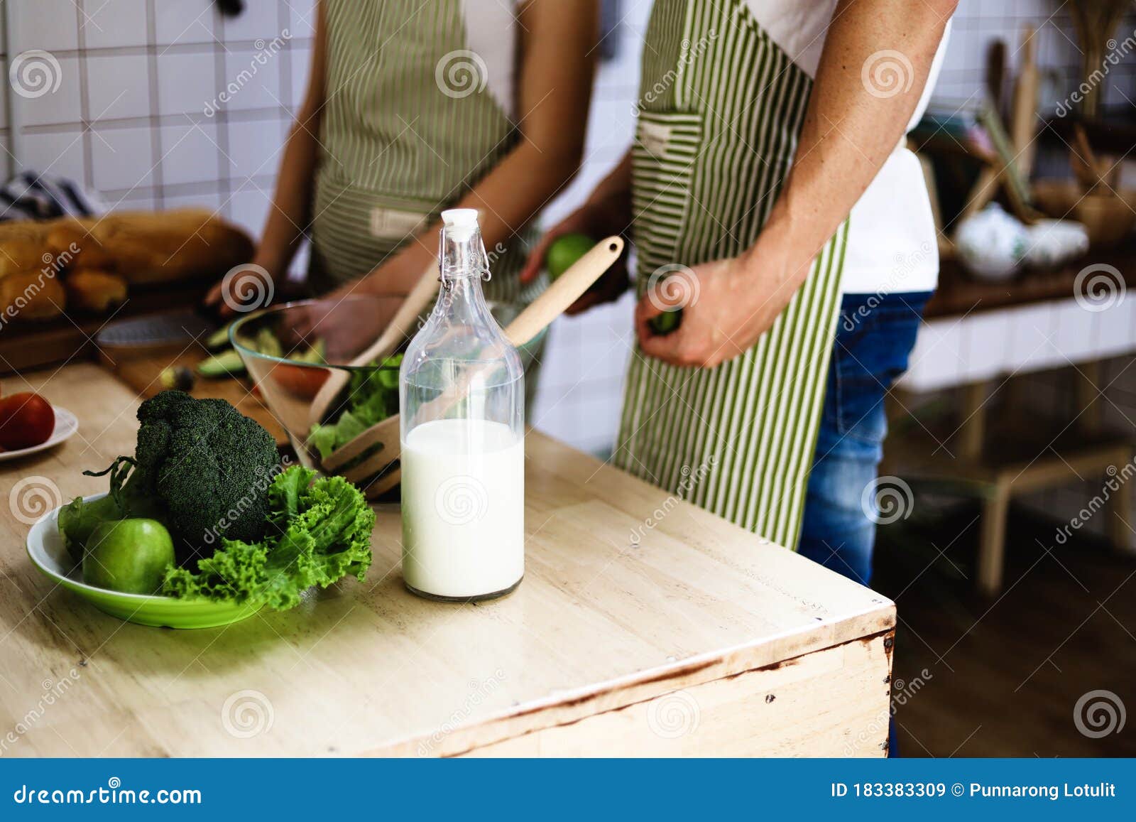 Young Couples are Enjoying Cooking at the Kitchen in Working from Home ...