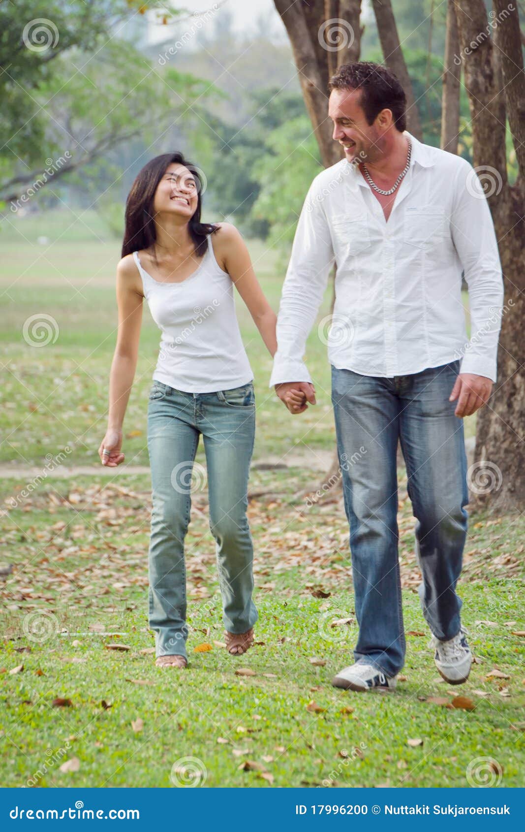 Young Couples Walk Hand in Hand Stock Photo - Image of together, women ...