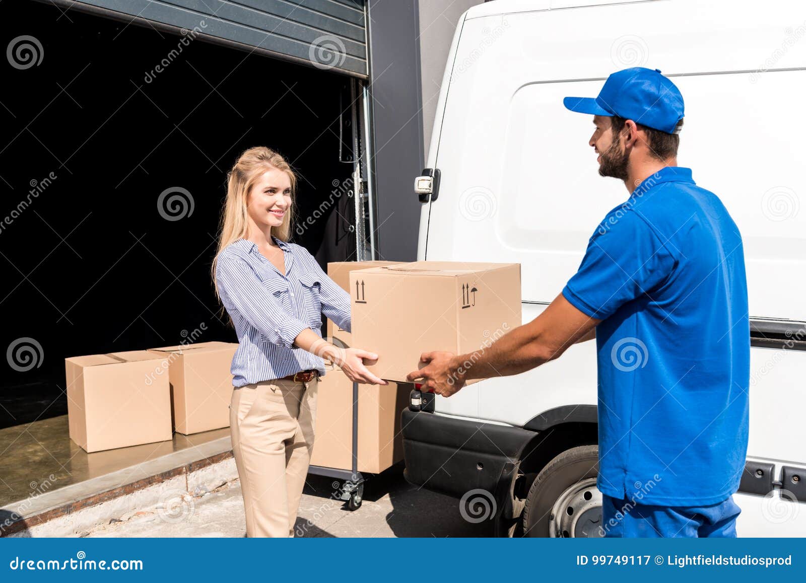 Courier Giving Package To Woman Stock Image - Image of work, truck ...