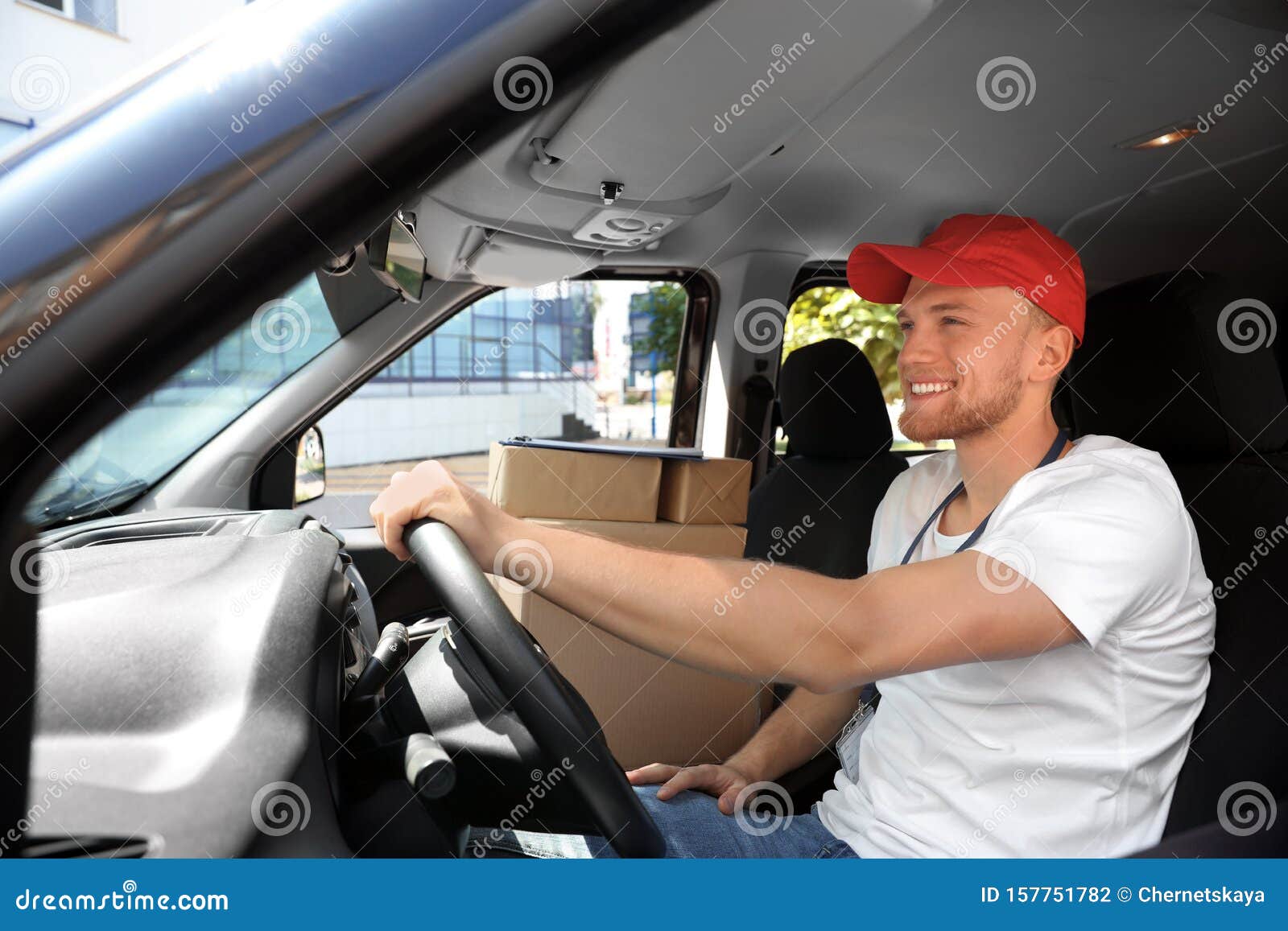 Young Courier with Parcels in Car Stock Photo - Image of business ...