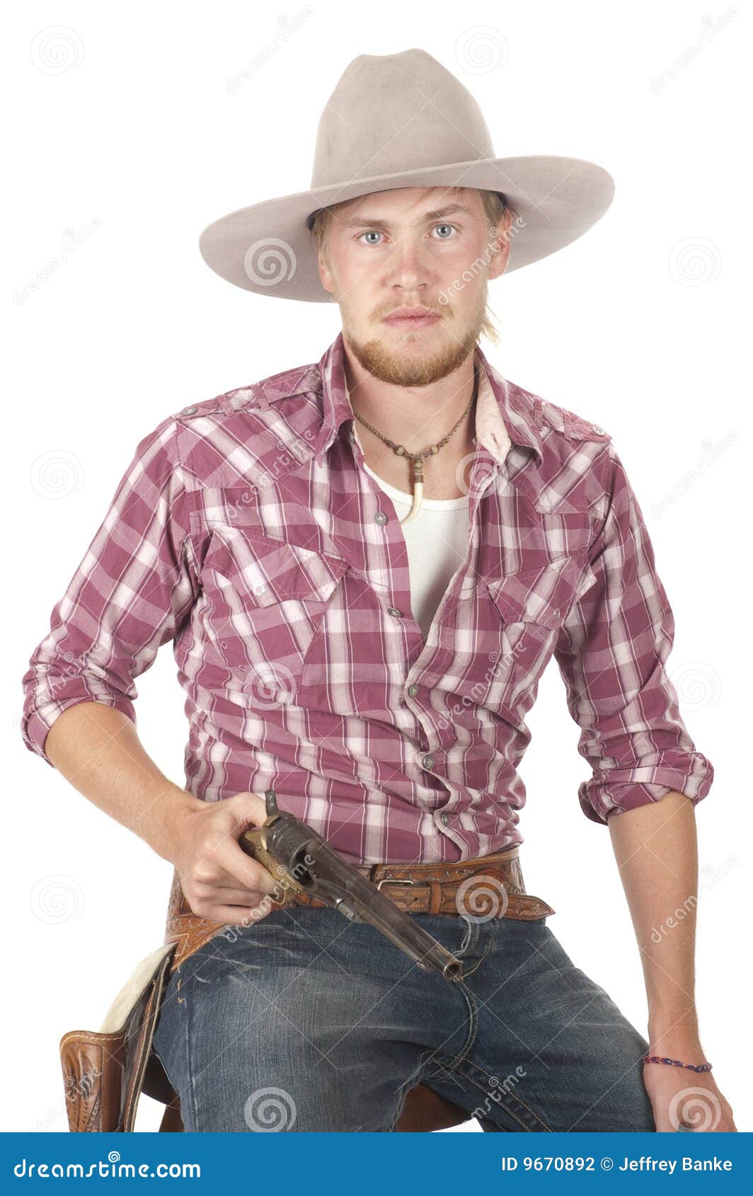 Young Cowboy with Drawn Pistol Stock Photo - Image of steel, pistol ...