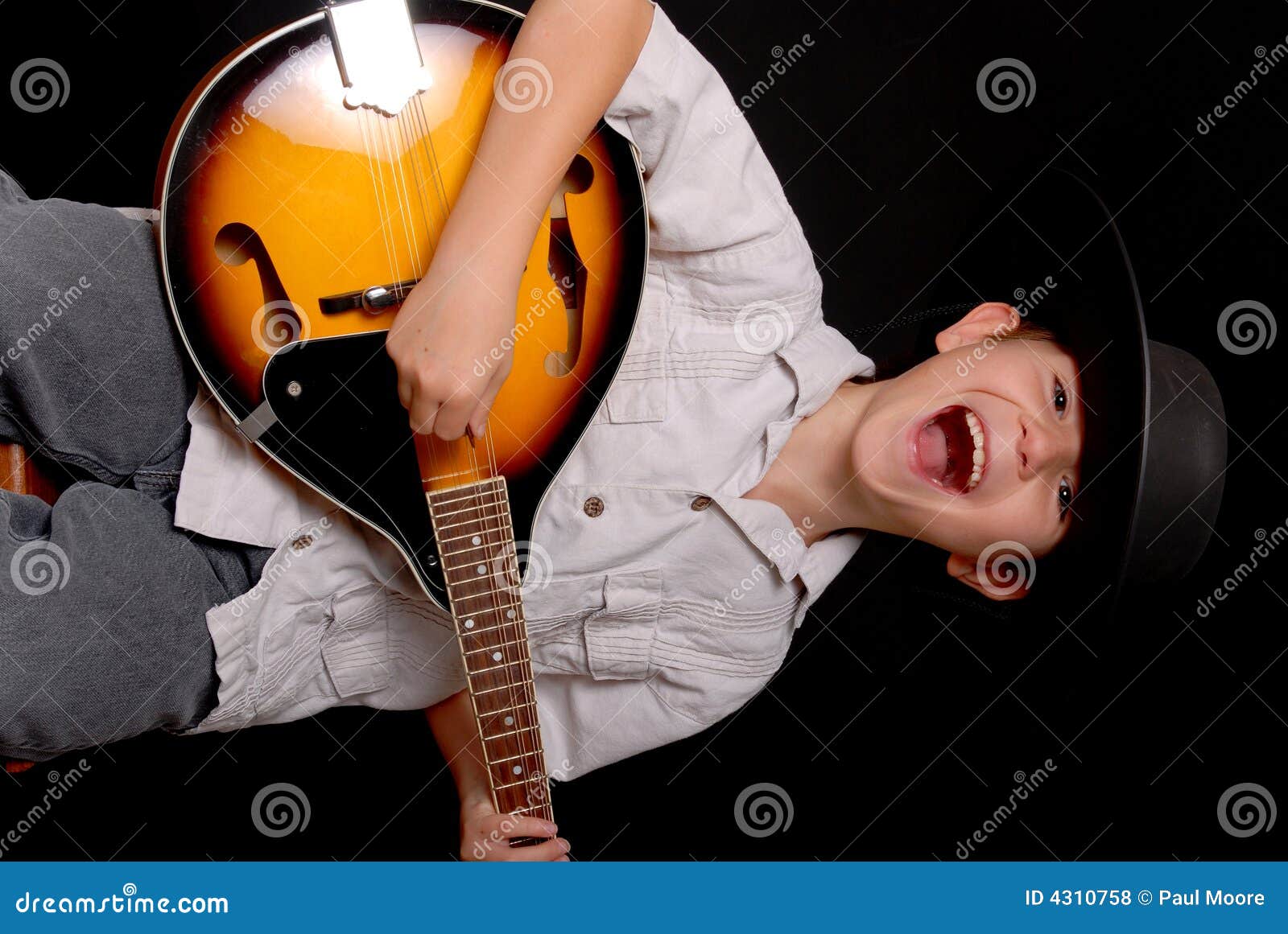 Young Cowboy Musician stock photo. Image of isolated, male - 4310758