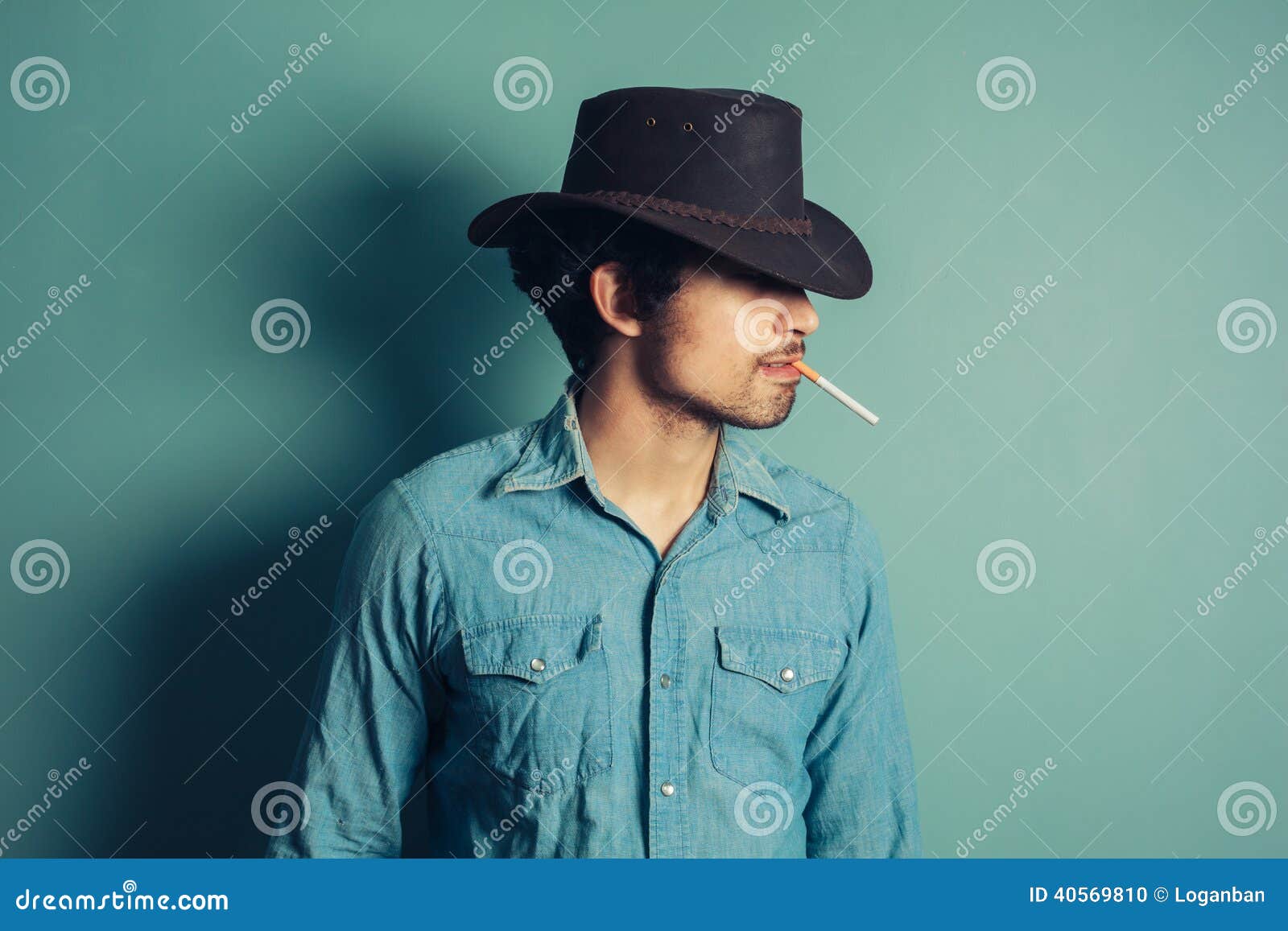 Young Cowboy Smoking Cigarette Stock Photo - Image of lifestyle, male ...