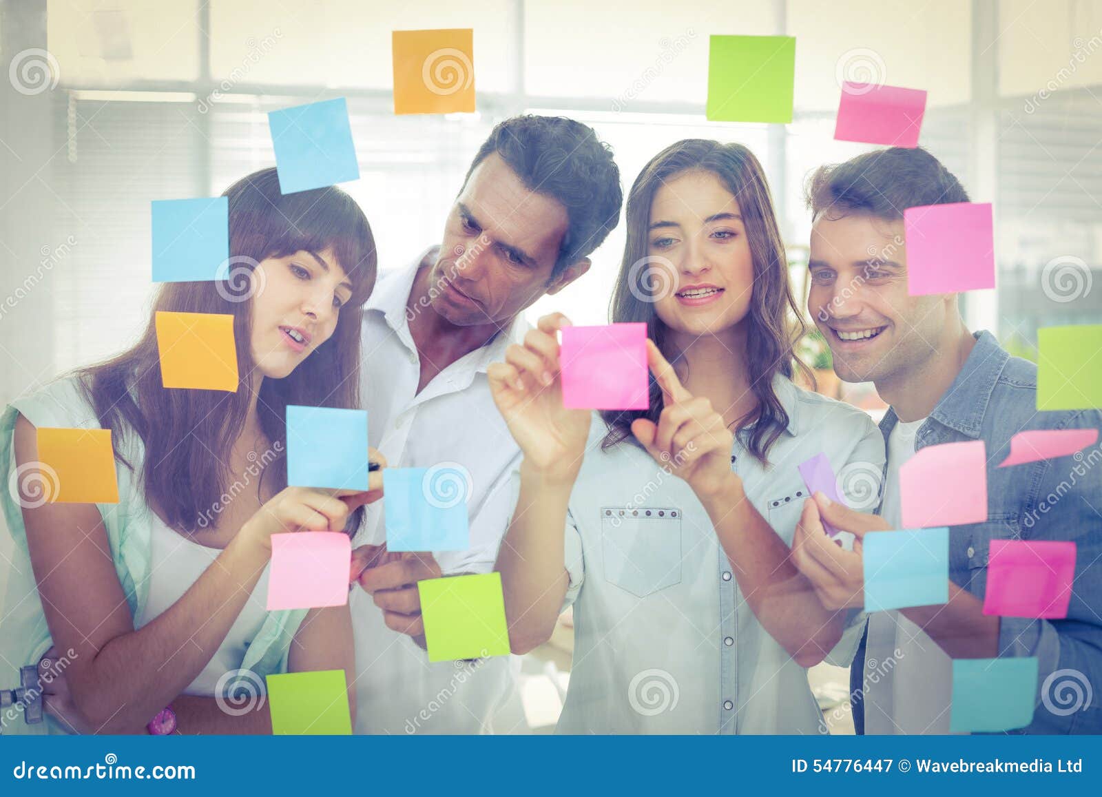 Young Creative Business People Looking at the Photo Editor Stock Image ...