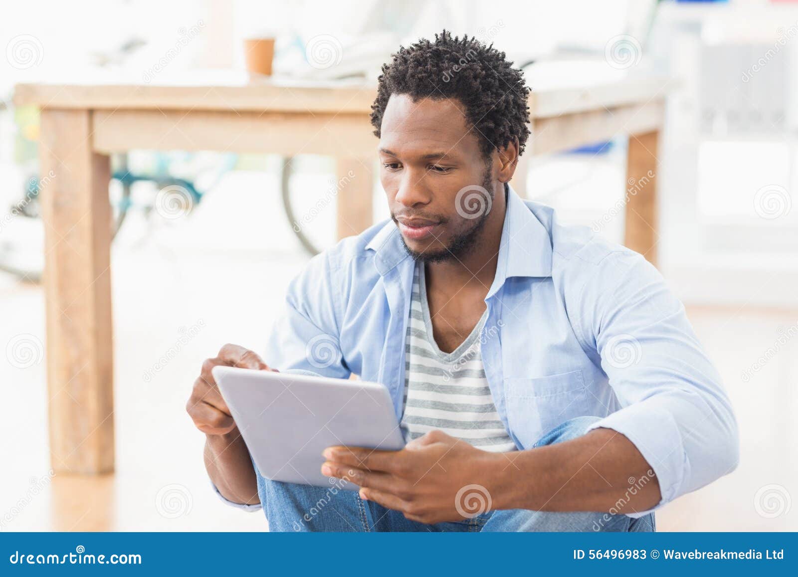 Young Creative Businessman Scrolling on the Tablet Stock Image - Image ...