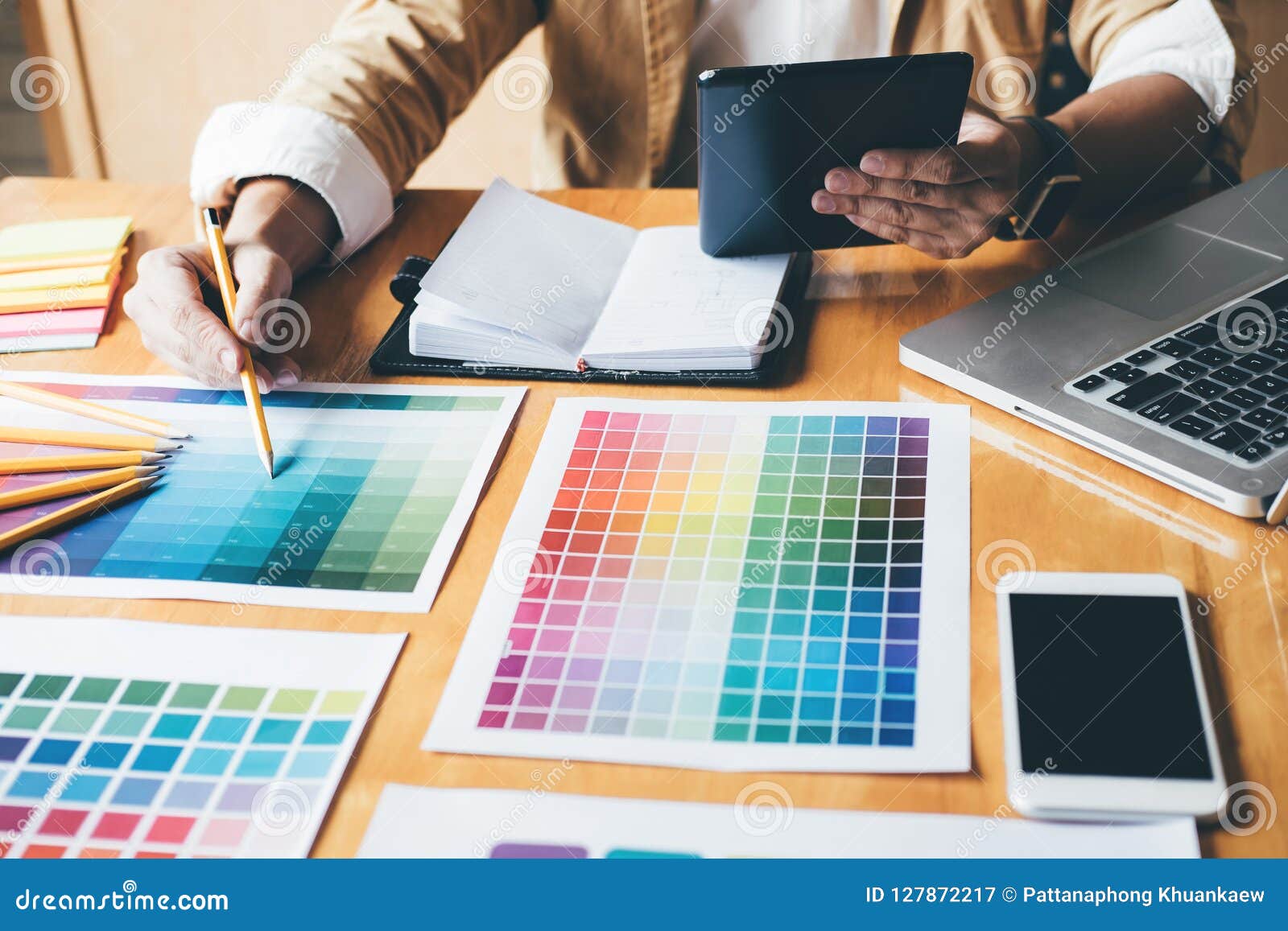 Young Creative Graphic Designer Using Graphics Tablet To Choosing Color ...