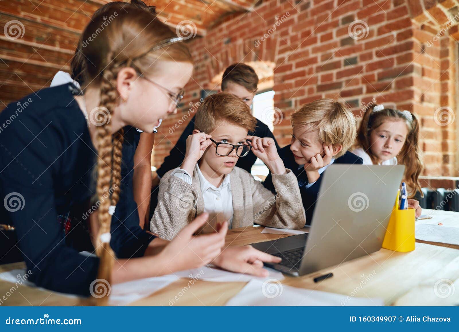 Young Creative Kids Creating a Presentation, Brainstorming in the ...