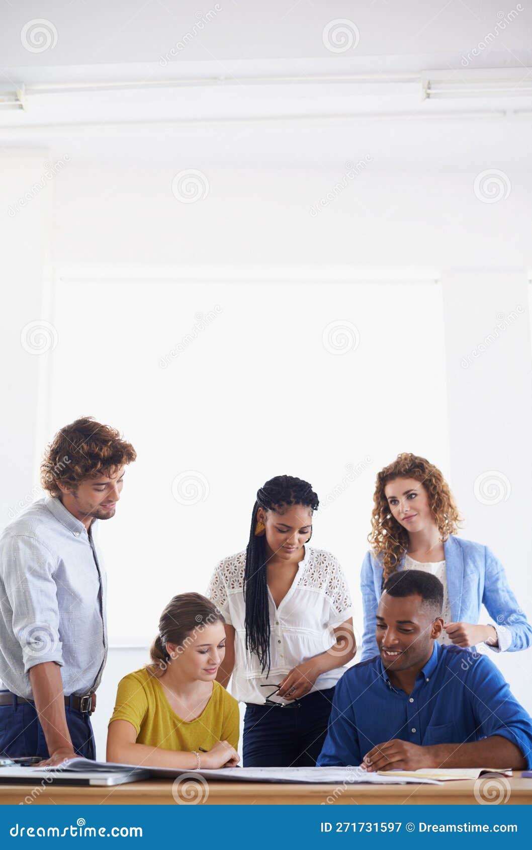 Young and Creative Minds Hard at Work. a Group of Young Coworkers ...