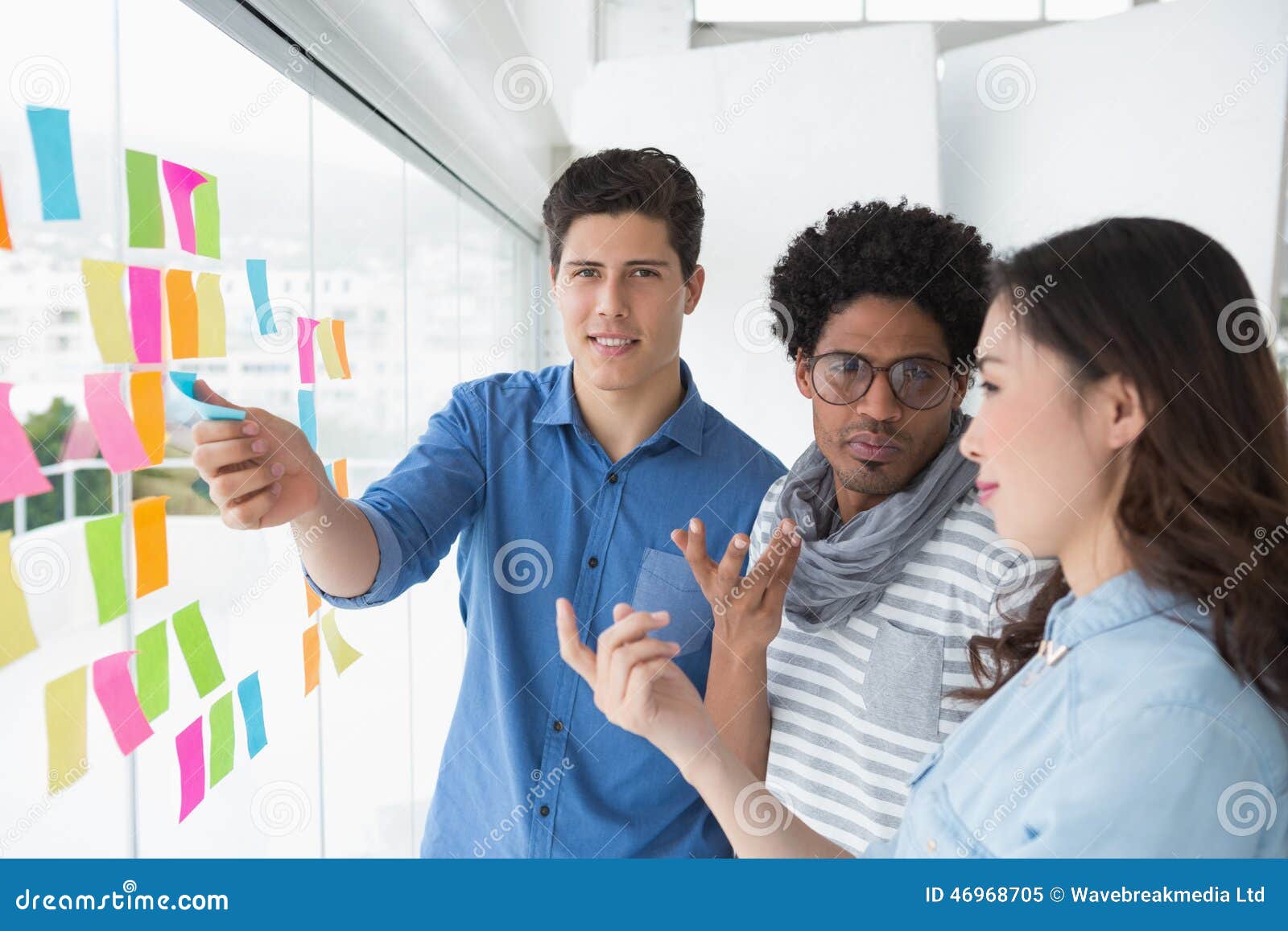 Young Creative Team Brainstorming Together Stock Image - Image of ...