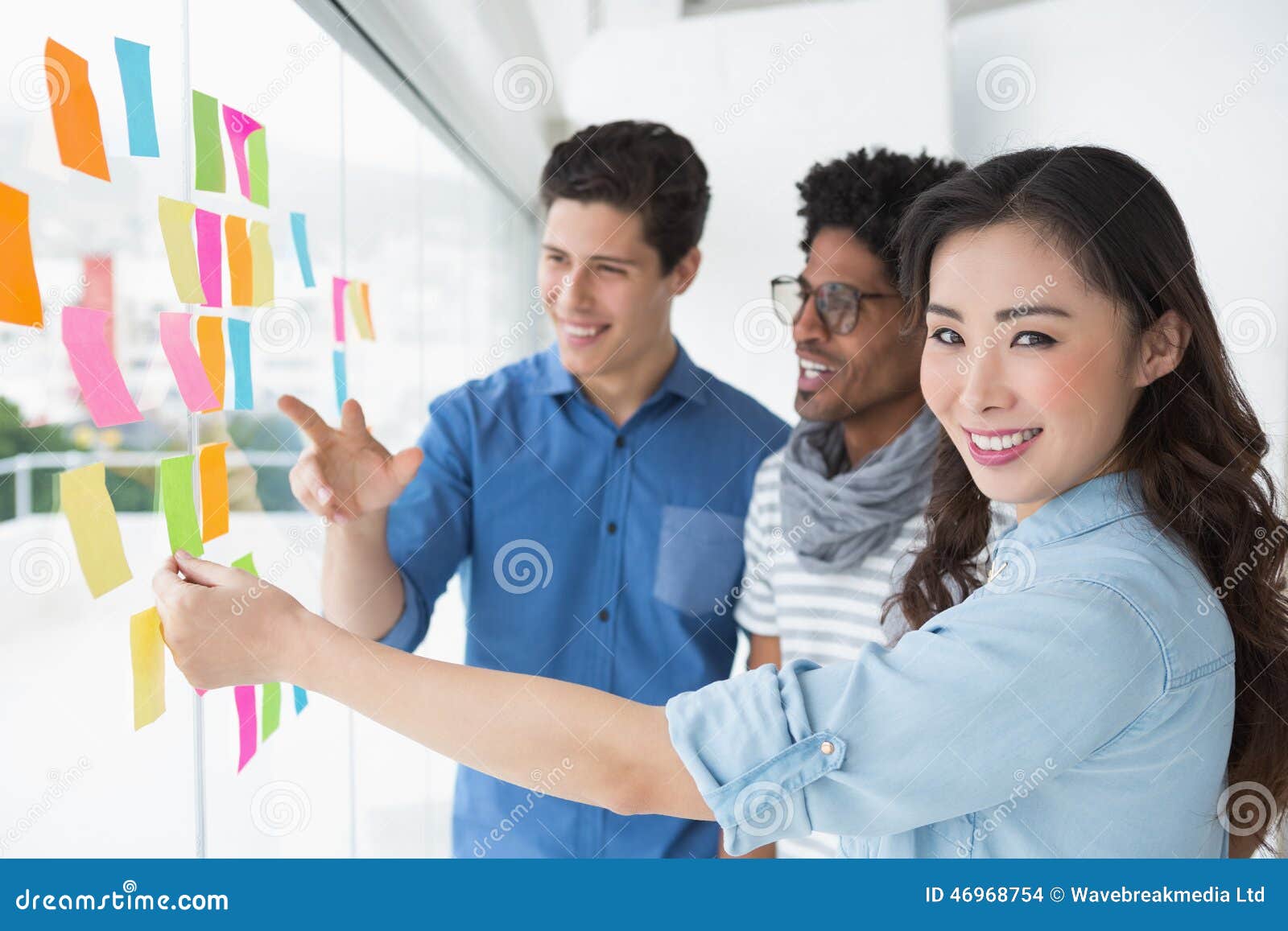 Young Creative Team Brainstorming Together Stock Photo - Image of ...