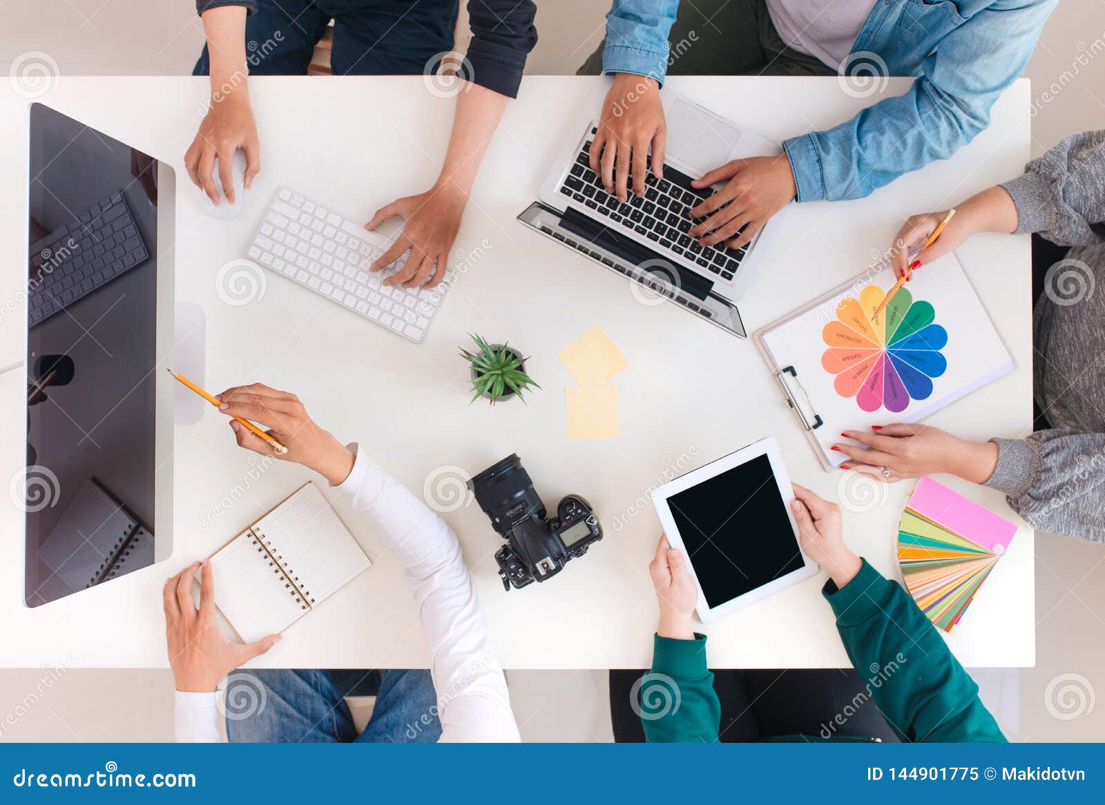 Young Creative Team Having a Meeting in Creative Office - Teamwork ...