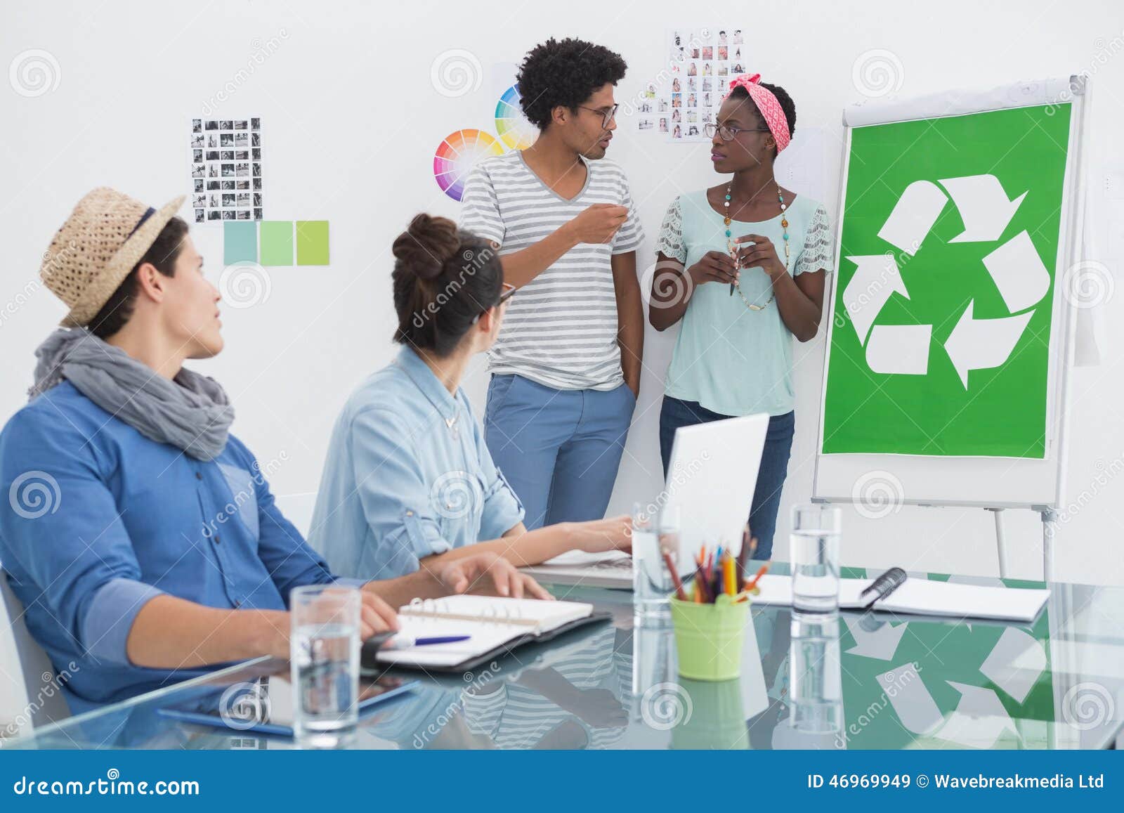 Young Creative Team Having a Meeting about Recycling Stock Image ...