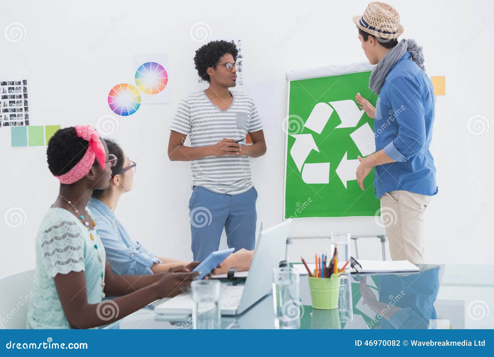 Young Creative Team Having a Meeting about Recycling Stock Photo ...