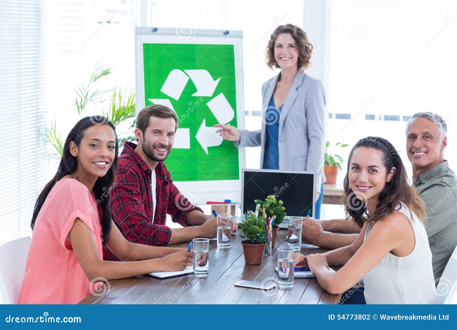 Young Creative Team Having a Meeting about Recycling Stock Photo ...
