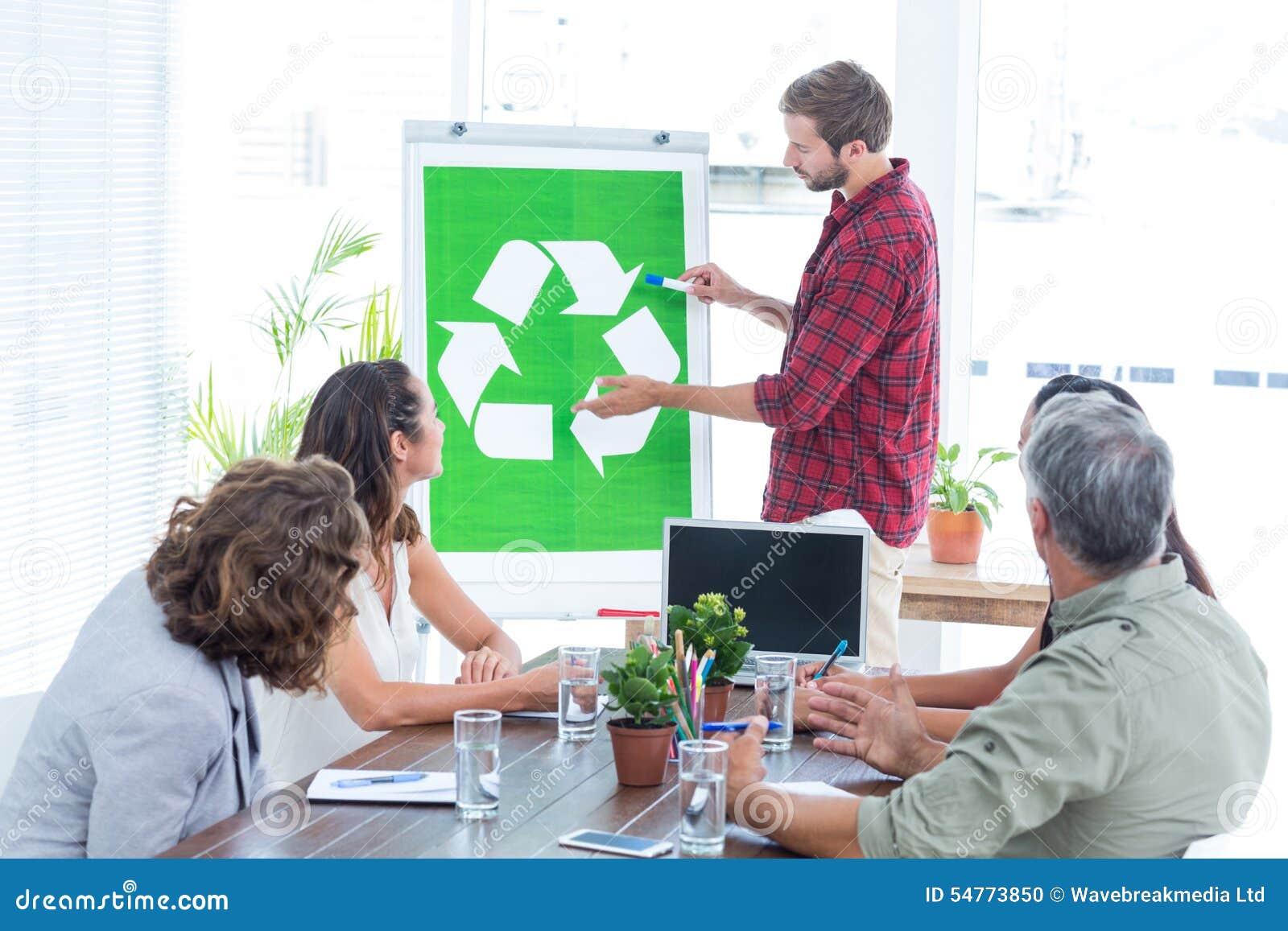 Young Creative Team Having a Meeting about Recycling Stock Photo ...