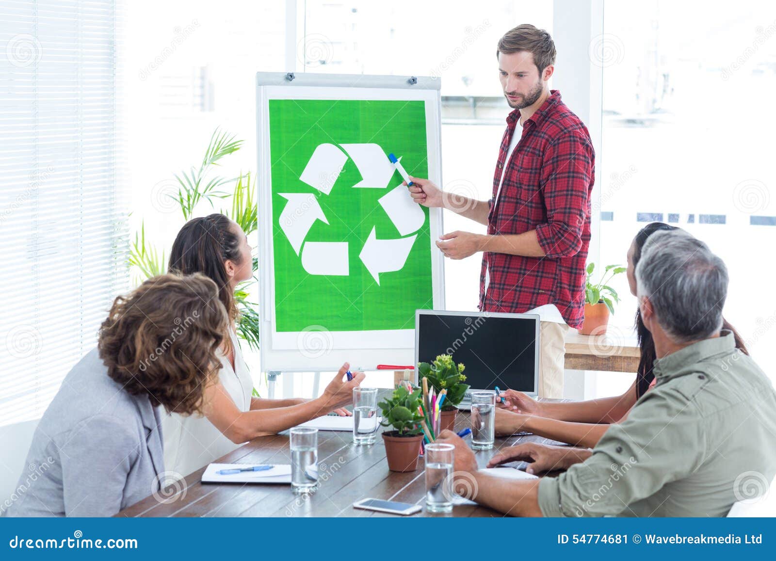 Young Creative Team Having a Meeting about Recycling Stock Image ...