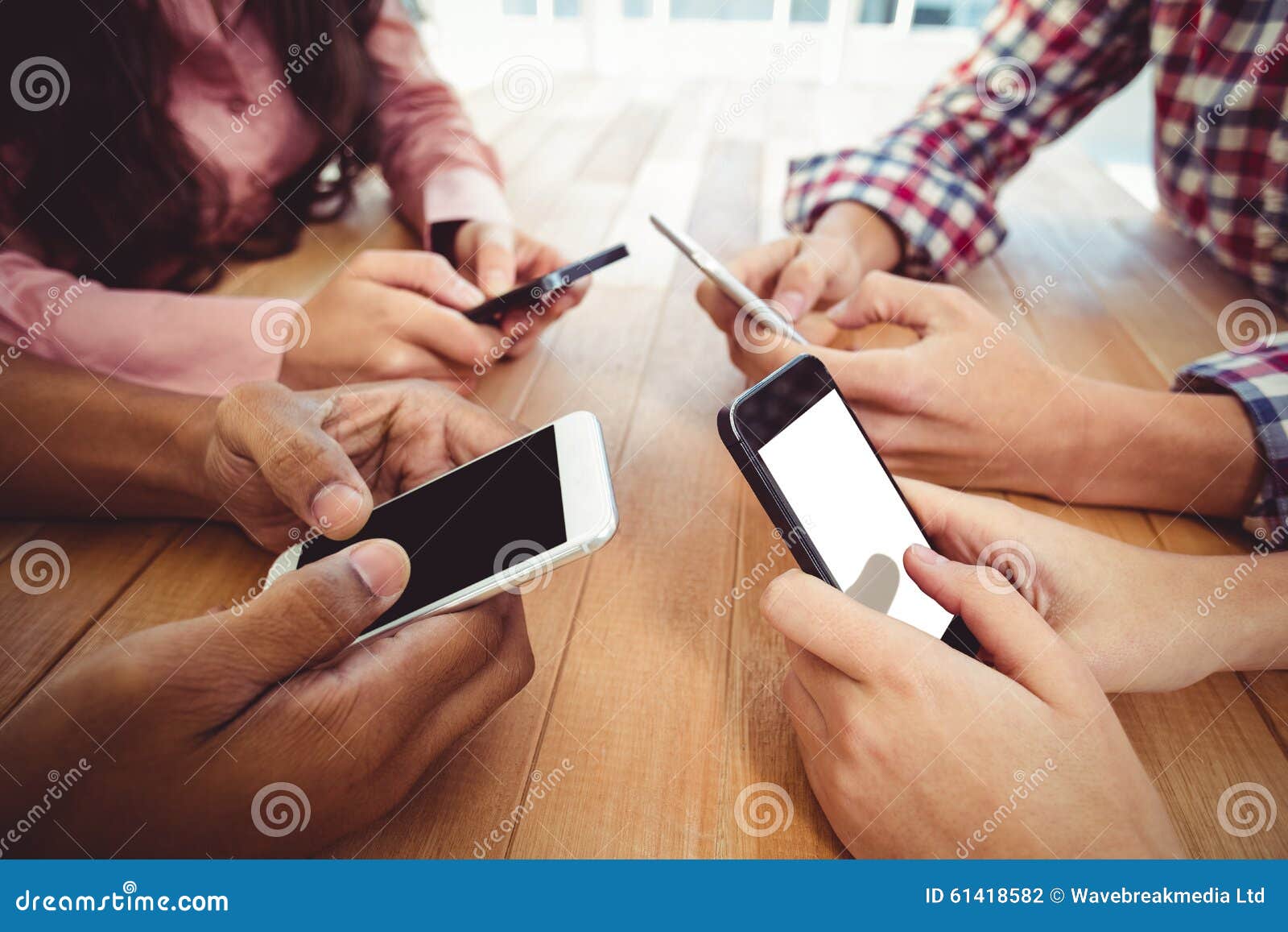 Young Creative Team Using Phones Stock Photo - Image of brainstorming ...