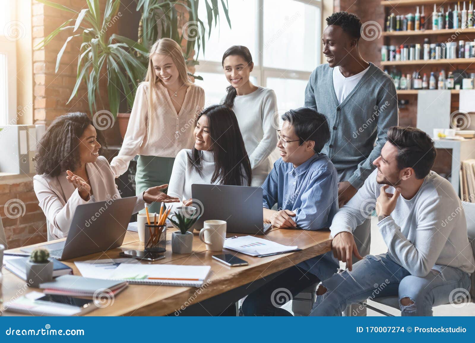 Young Creative Team Working on Group Business Project Stock Photo ...