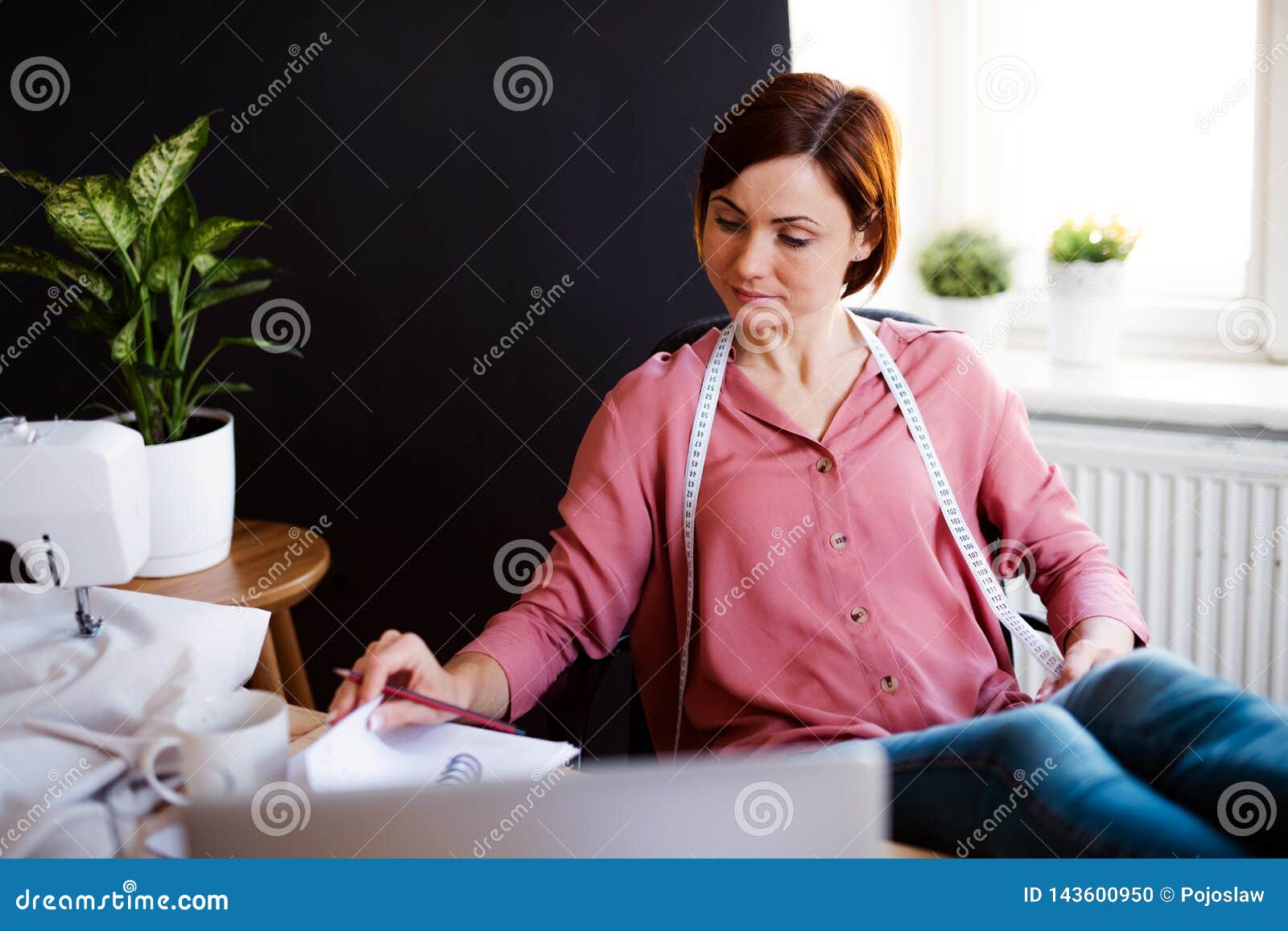 Young Creative Woman in a Studio, Working. a Startup of Tailoring ...