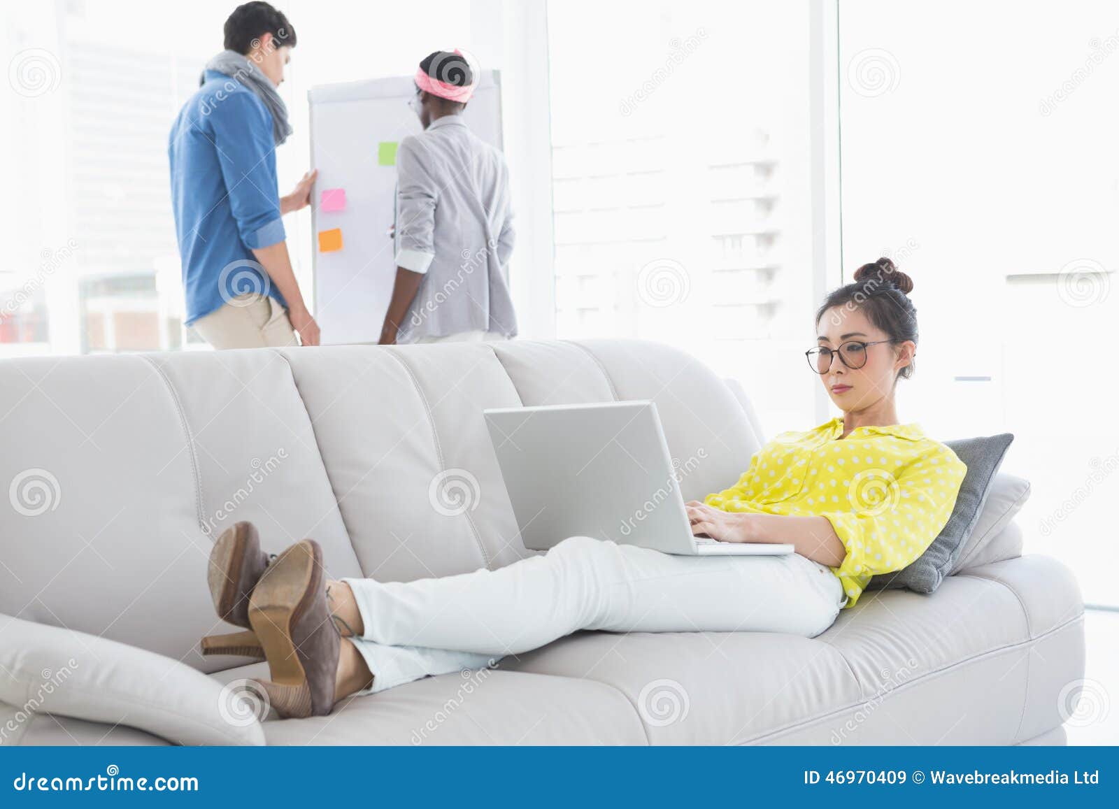 Young Creative Woman Using Laptop on Couch Stock Image - Image of ...