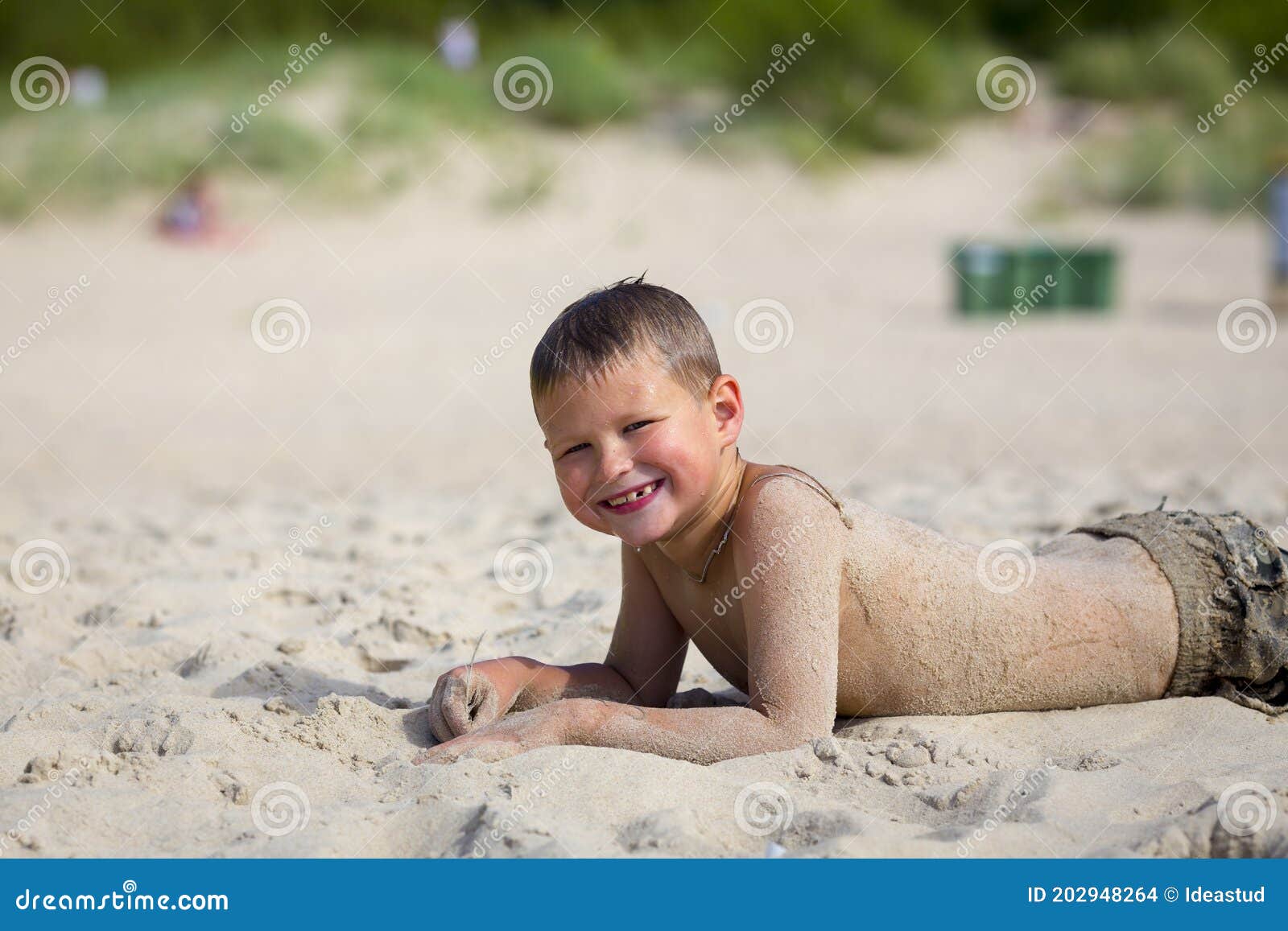 Young Cute Boy Having Fun on Sand Beach. Stock Photo - Image of lying ...